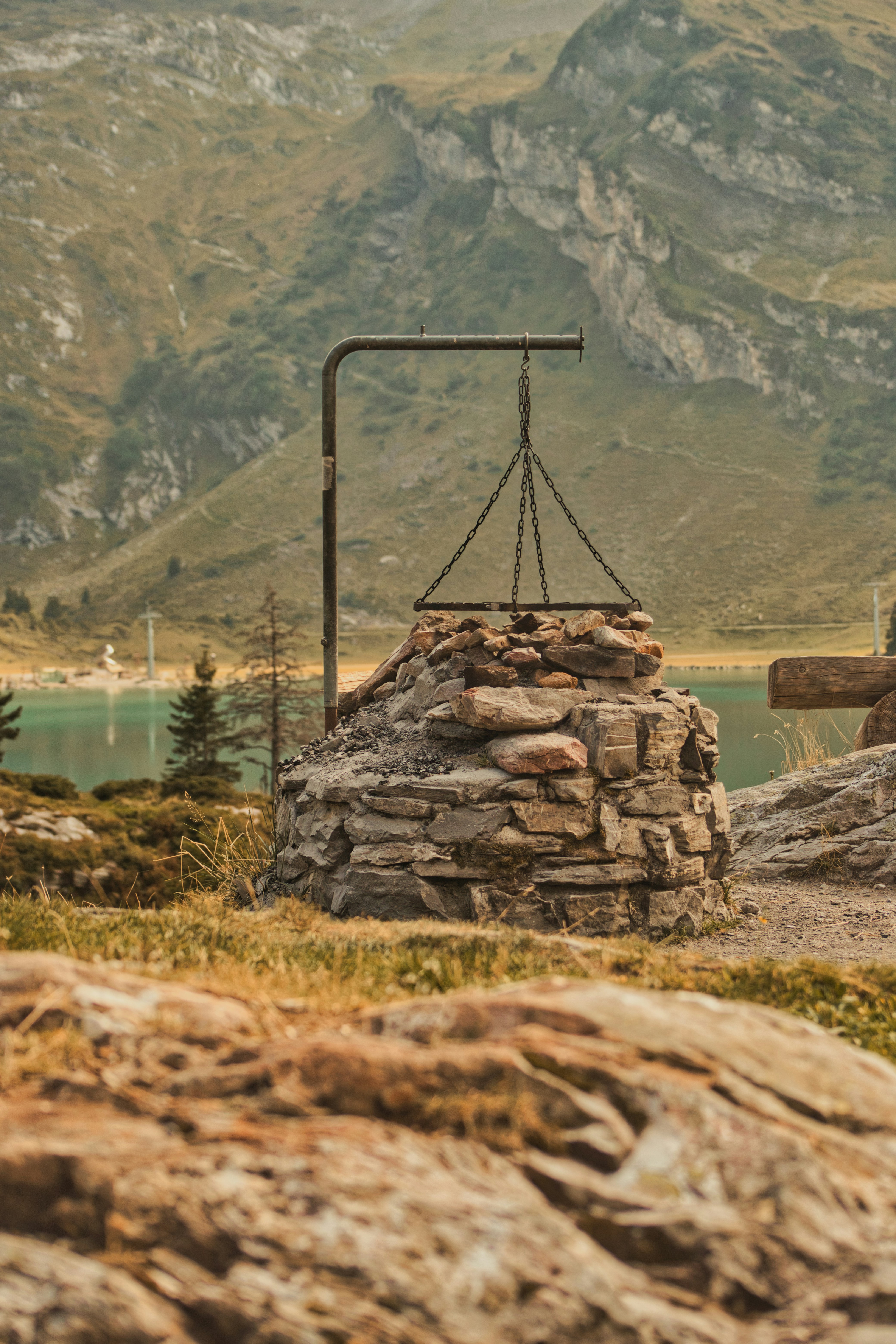Suspended Stone Lantern Above a Mountain Lake