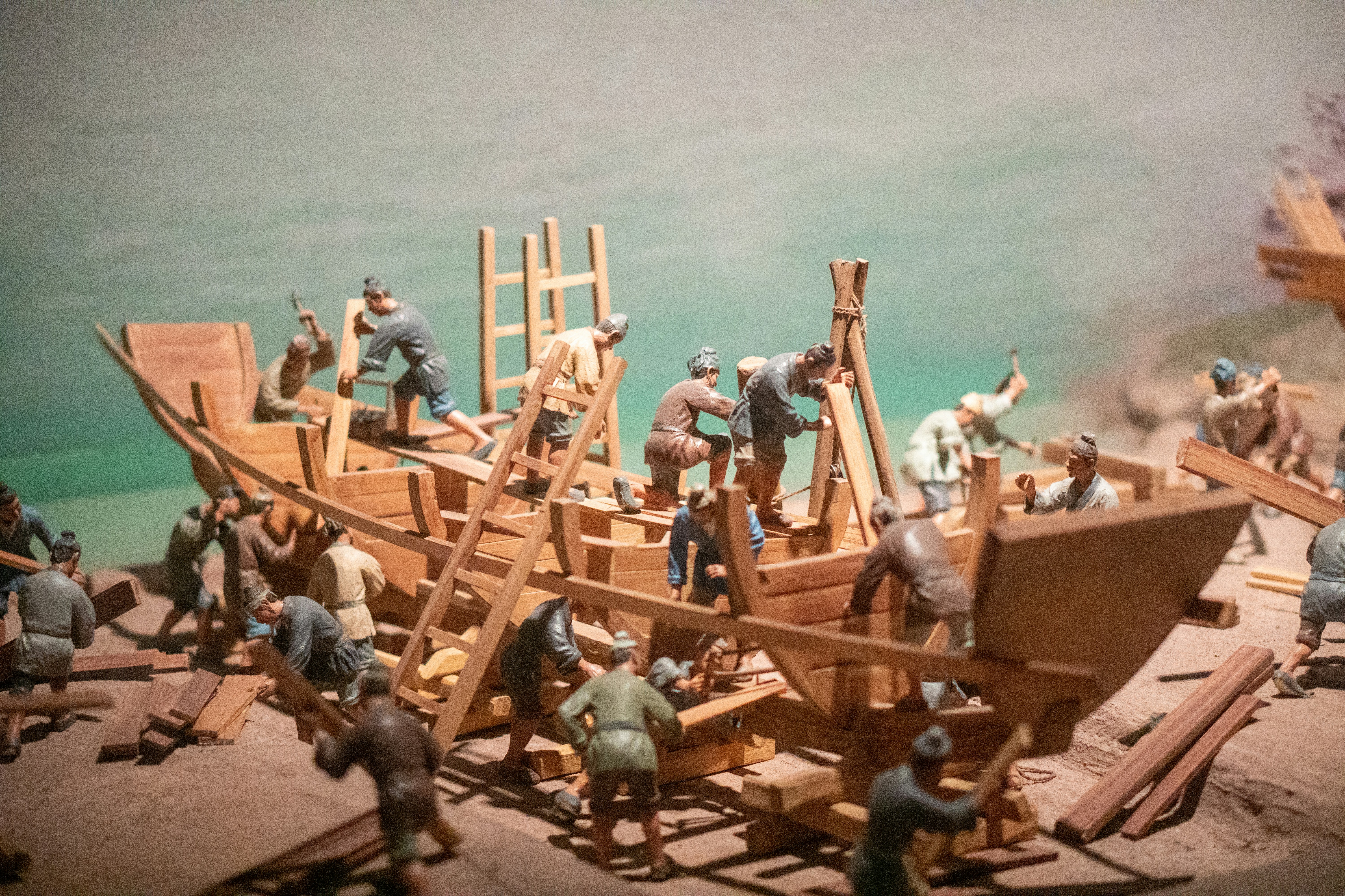Miniature Shipwrights at Dawn: A Wooden Harbor in Motion