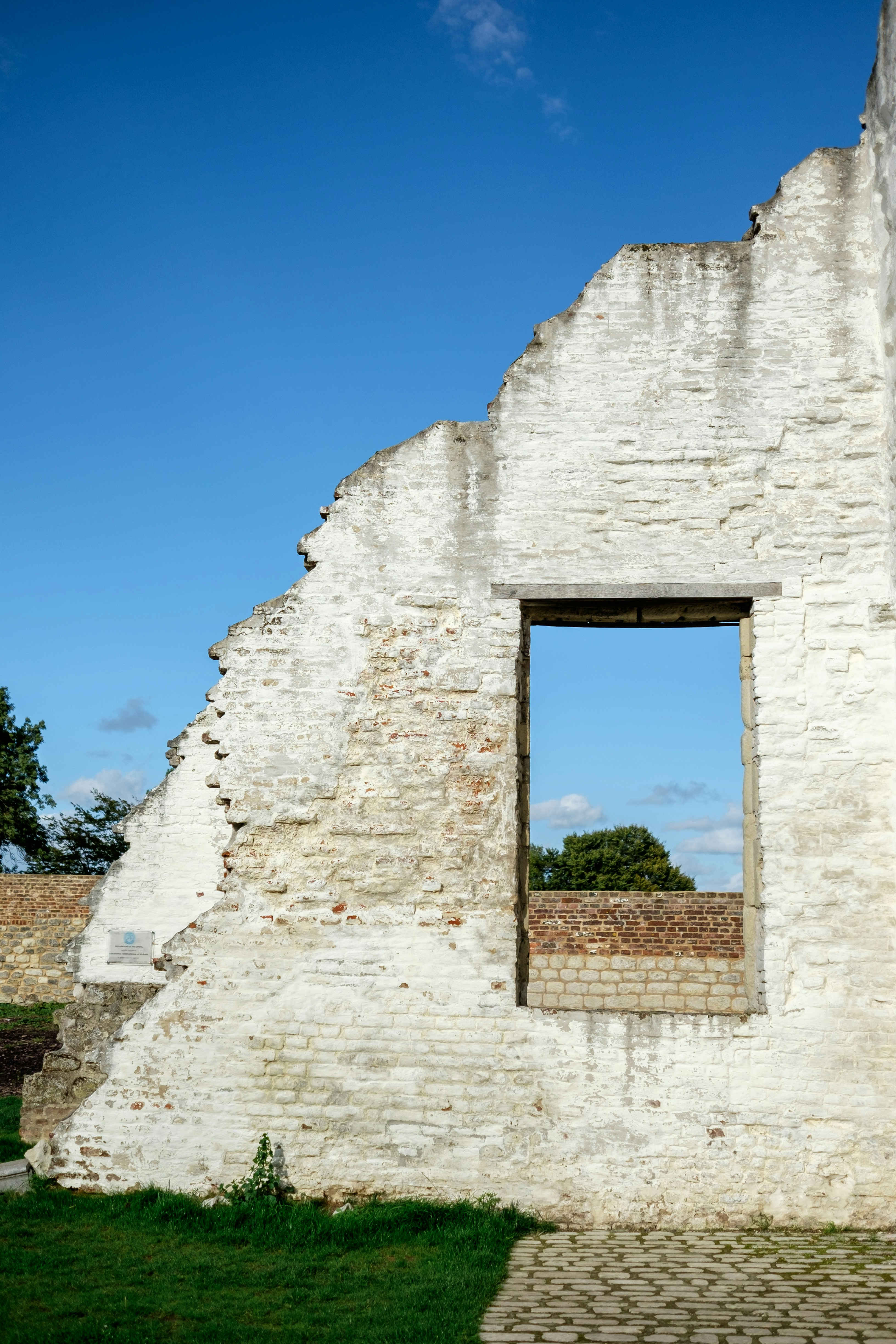 A white brick building with a small window photo – Free Waterloo Image ...