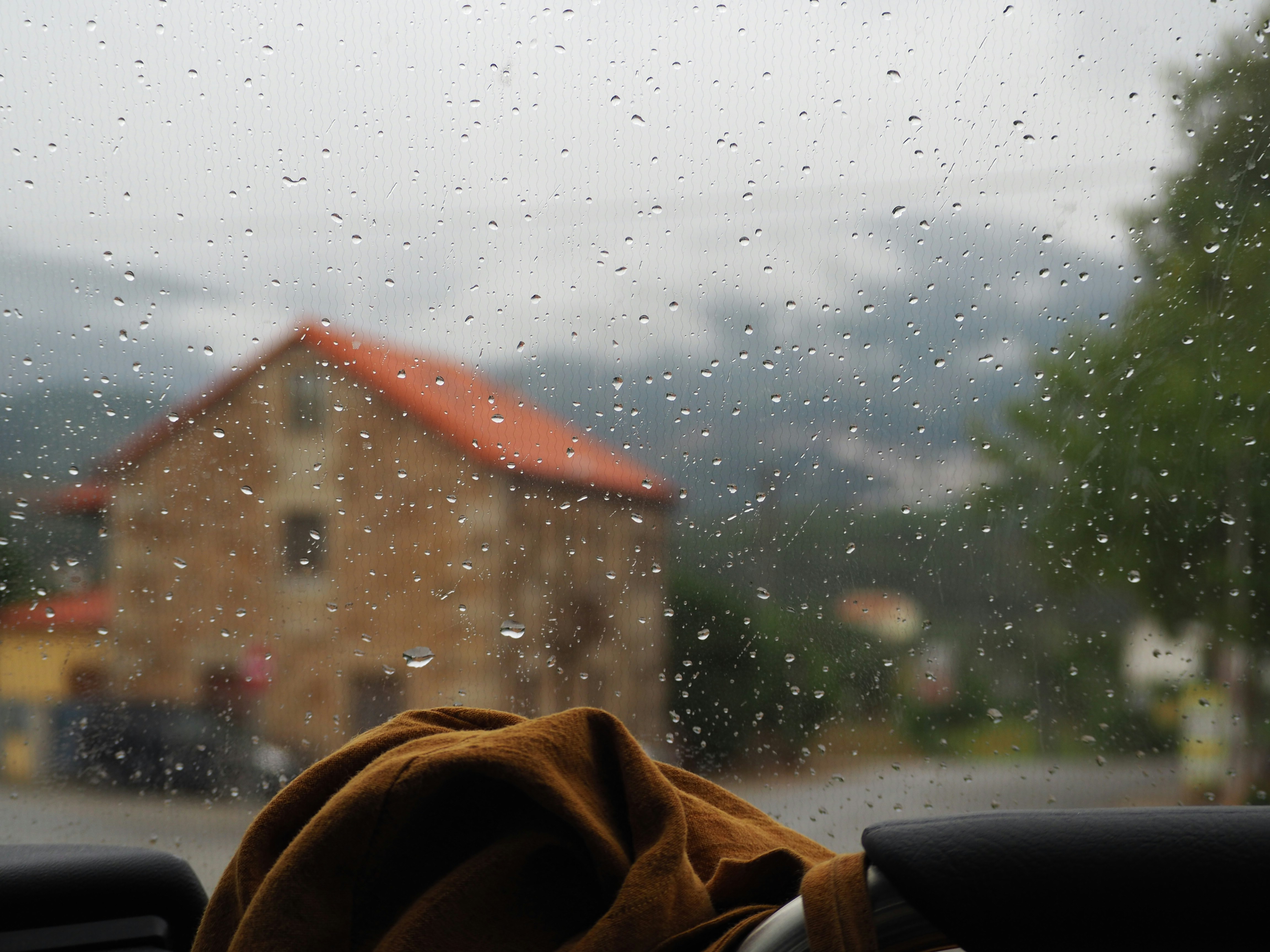 Rainy Window Moment: Bursts on the Windshield