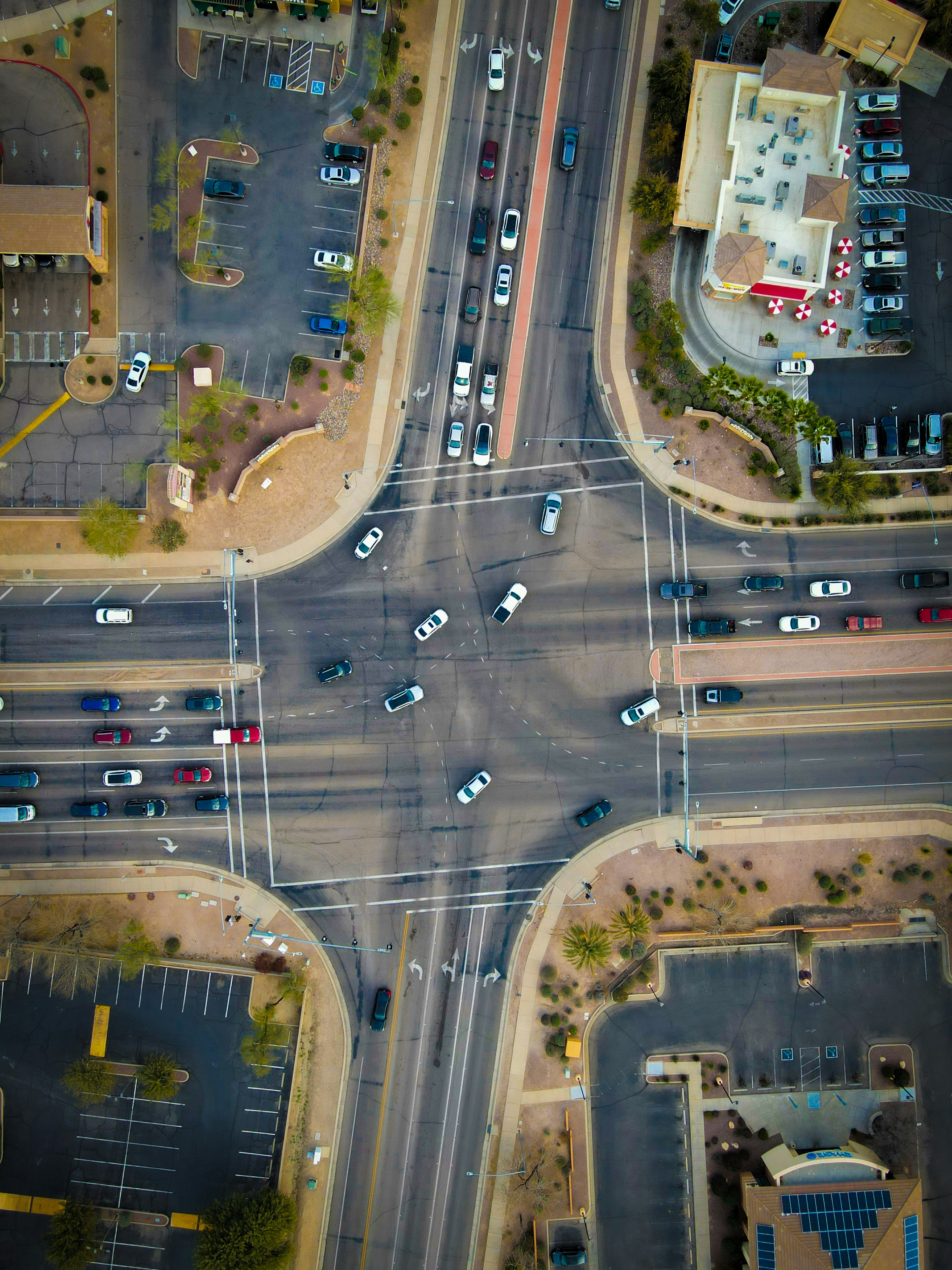An aerial view of a street intersection with cars photo – Free Car ...
