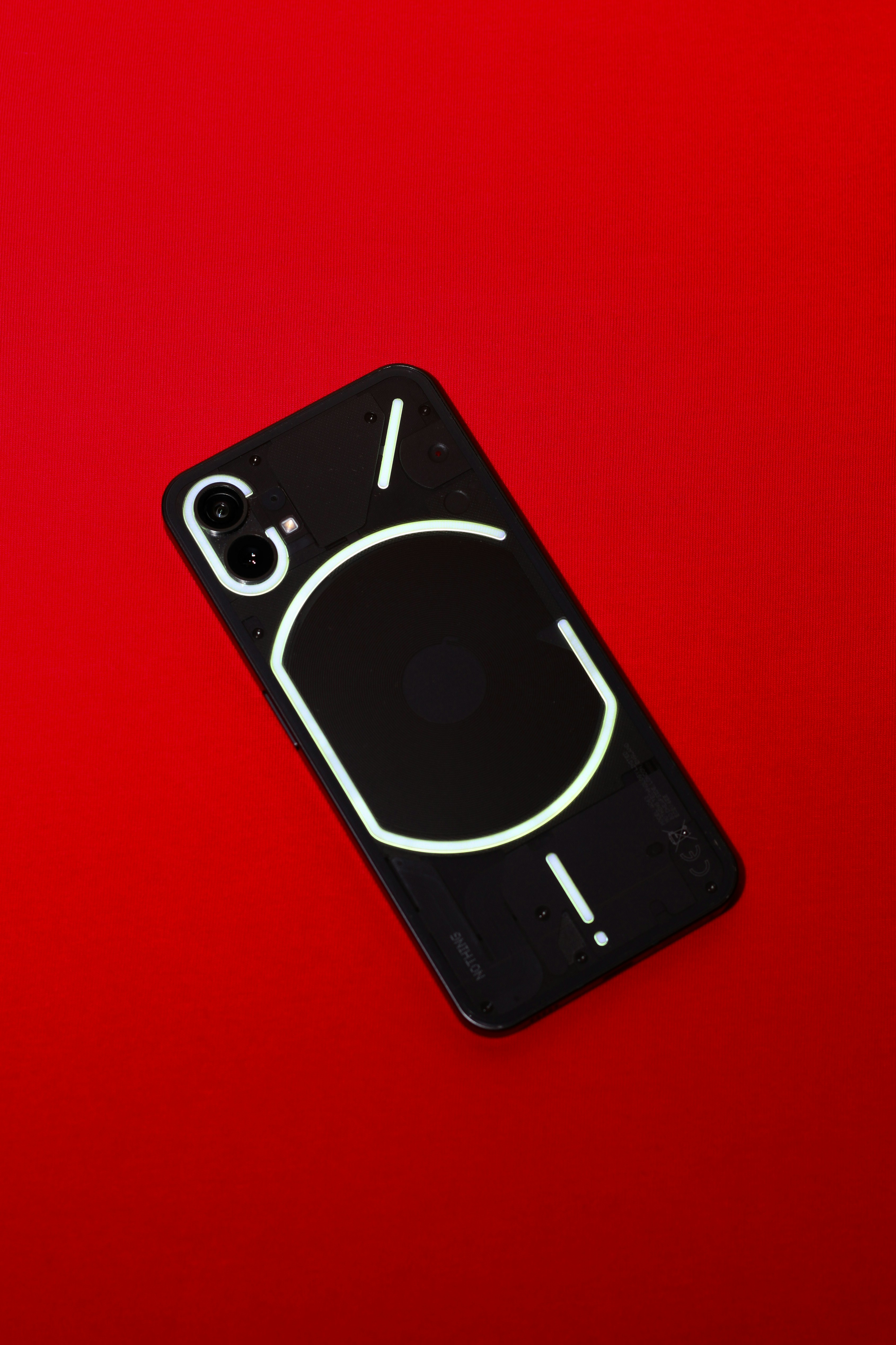 A cell phone with a neon light on the back of it photo – Free Mumbai ...