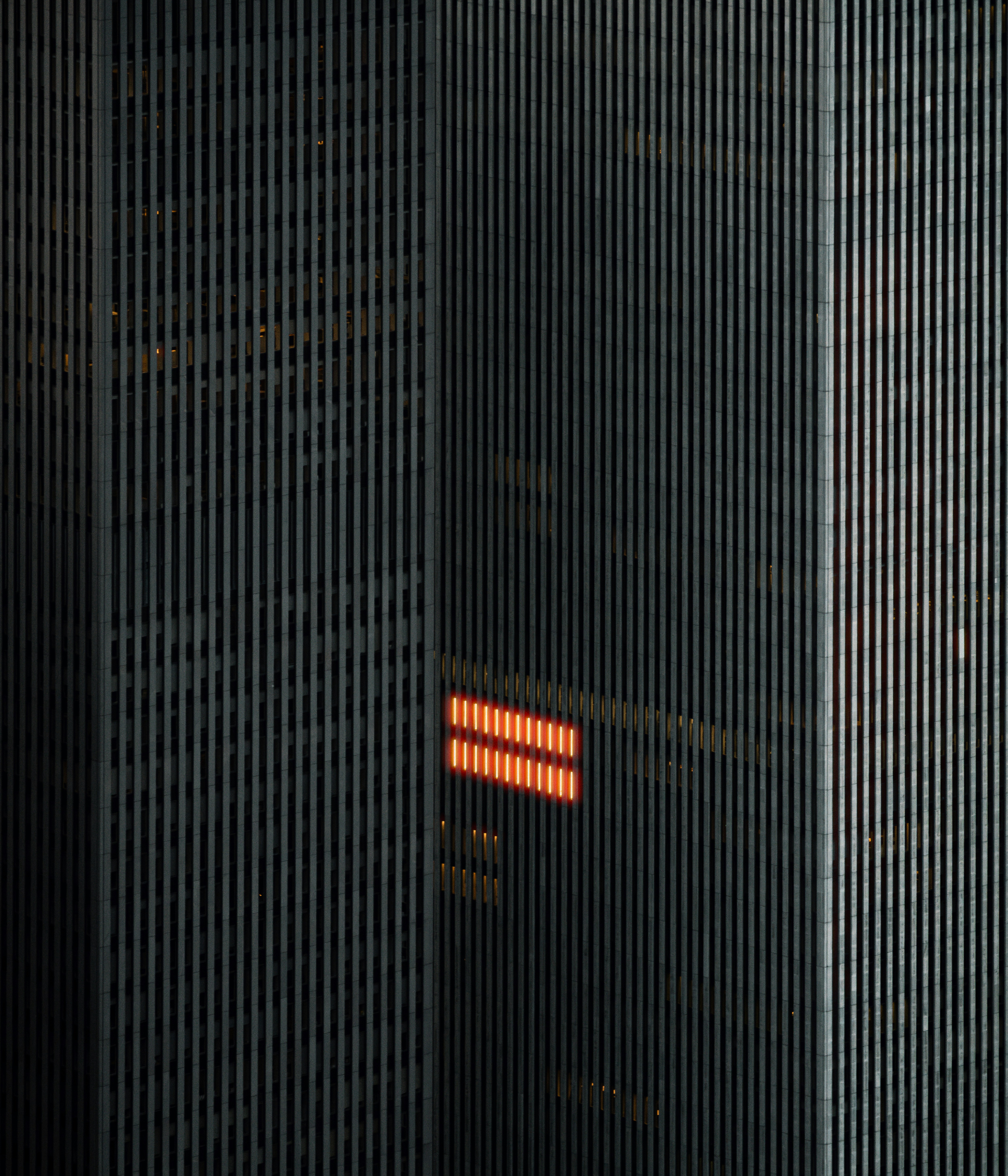 Silent Grid: Neon Gaps in a Faced Wall