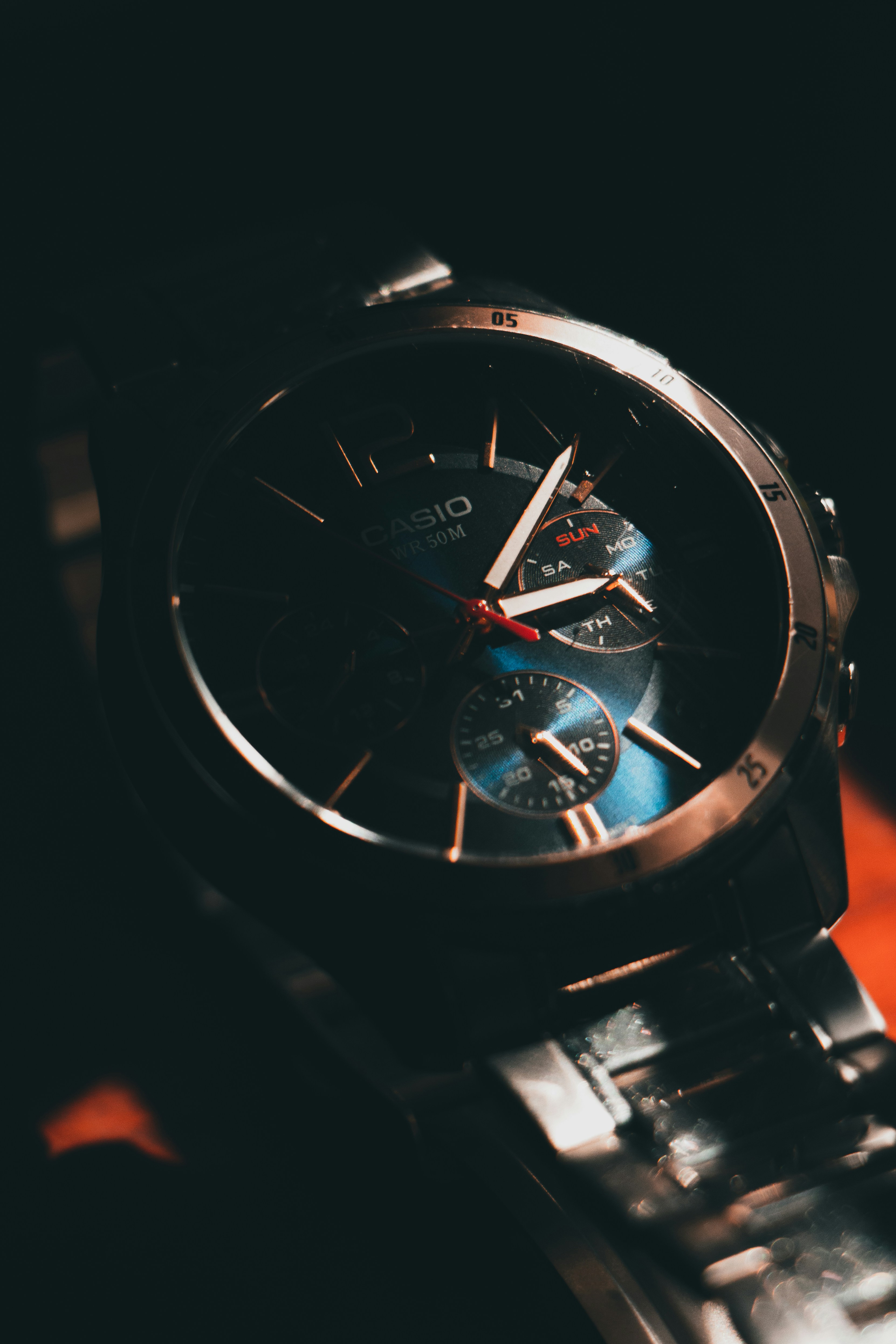 A close up of a watch on a table photo – Free Watch wallpaper Image on ...