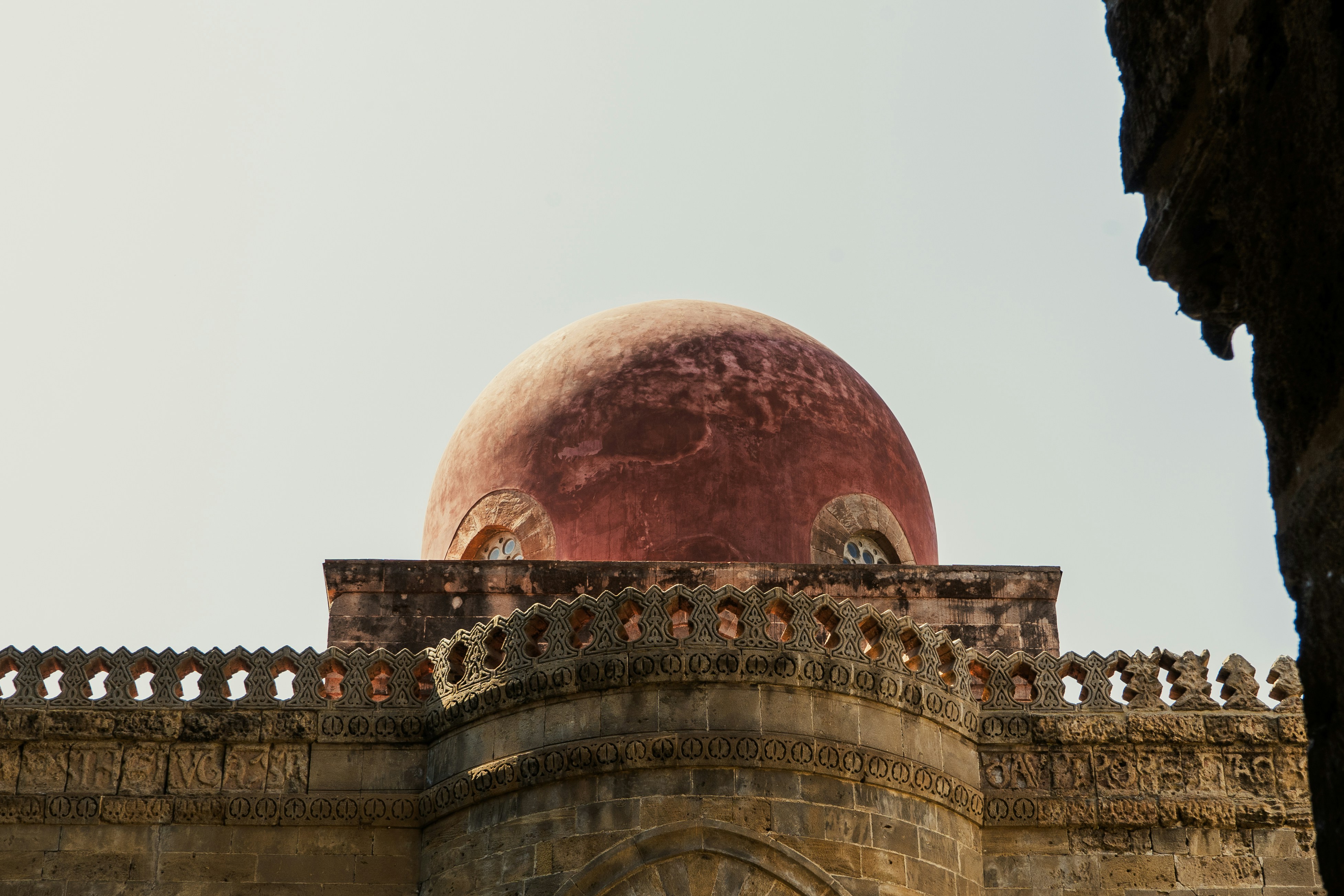 Ruined Dome Gaze: A Weathered Fortification Crowned by a Crimson Sphere