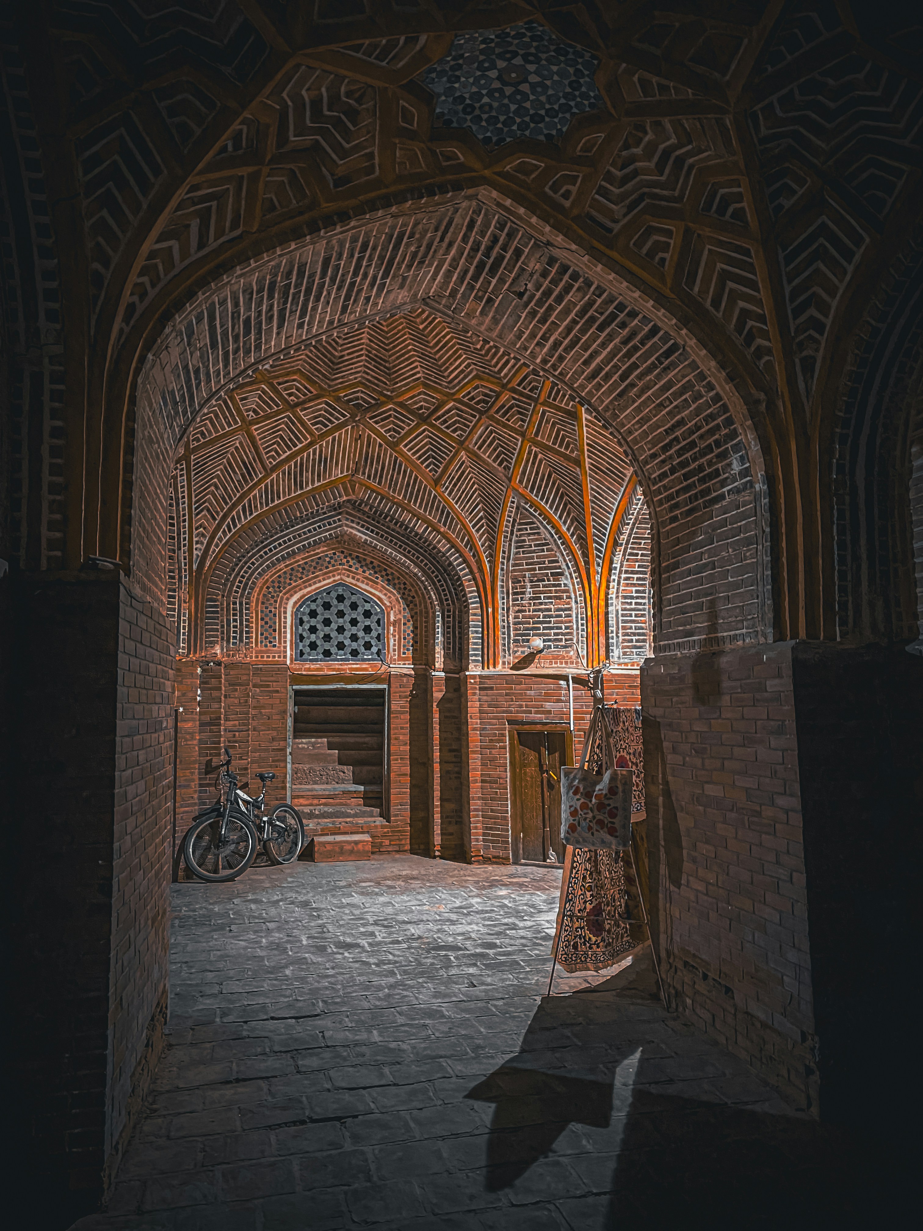 An ancient street with a bicycle in central Asia