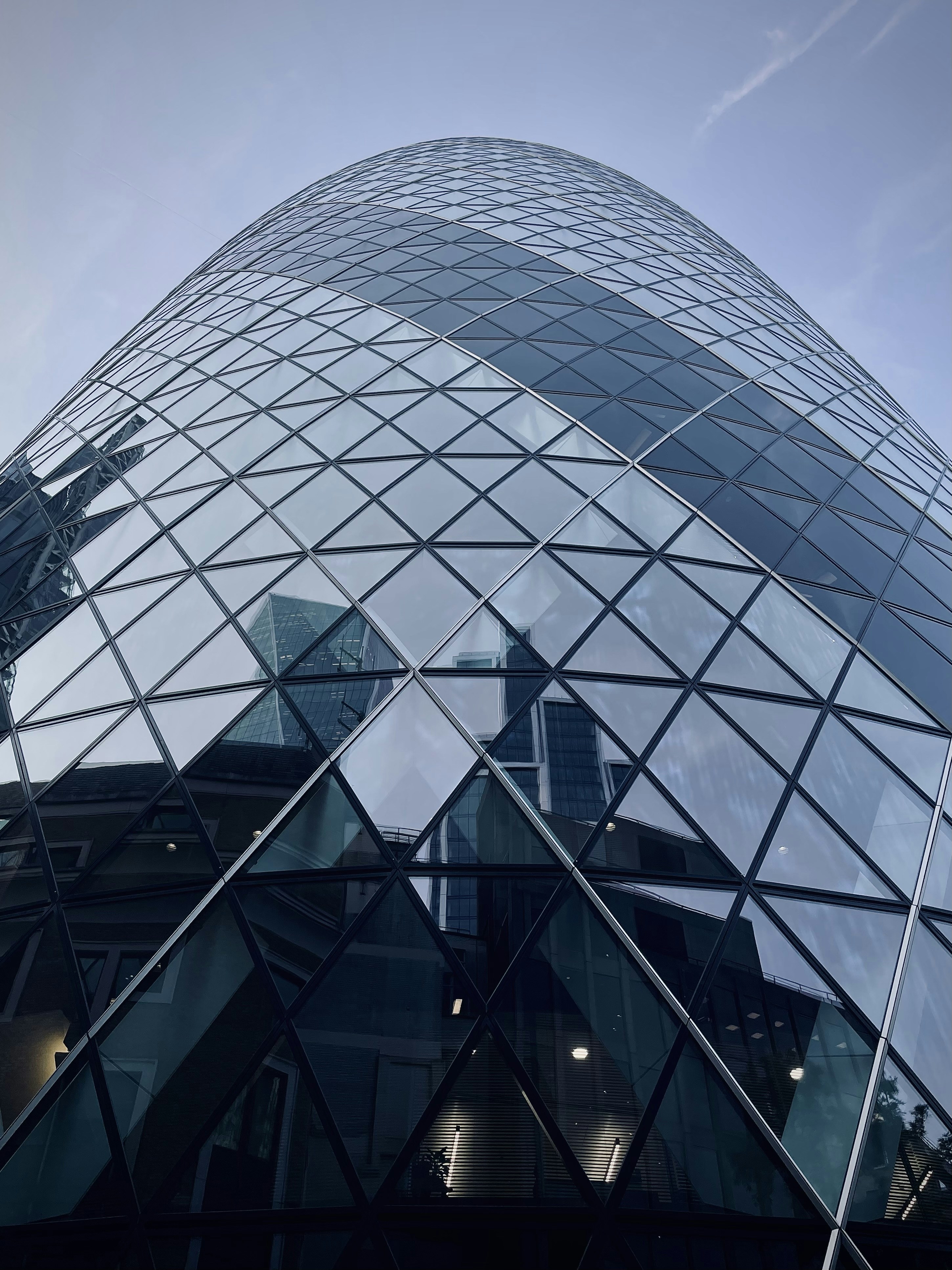 A very tall glass building with a sky background photo – Free United ...