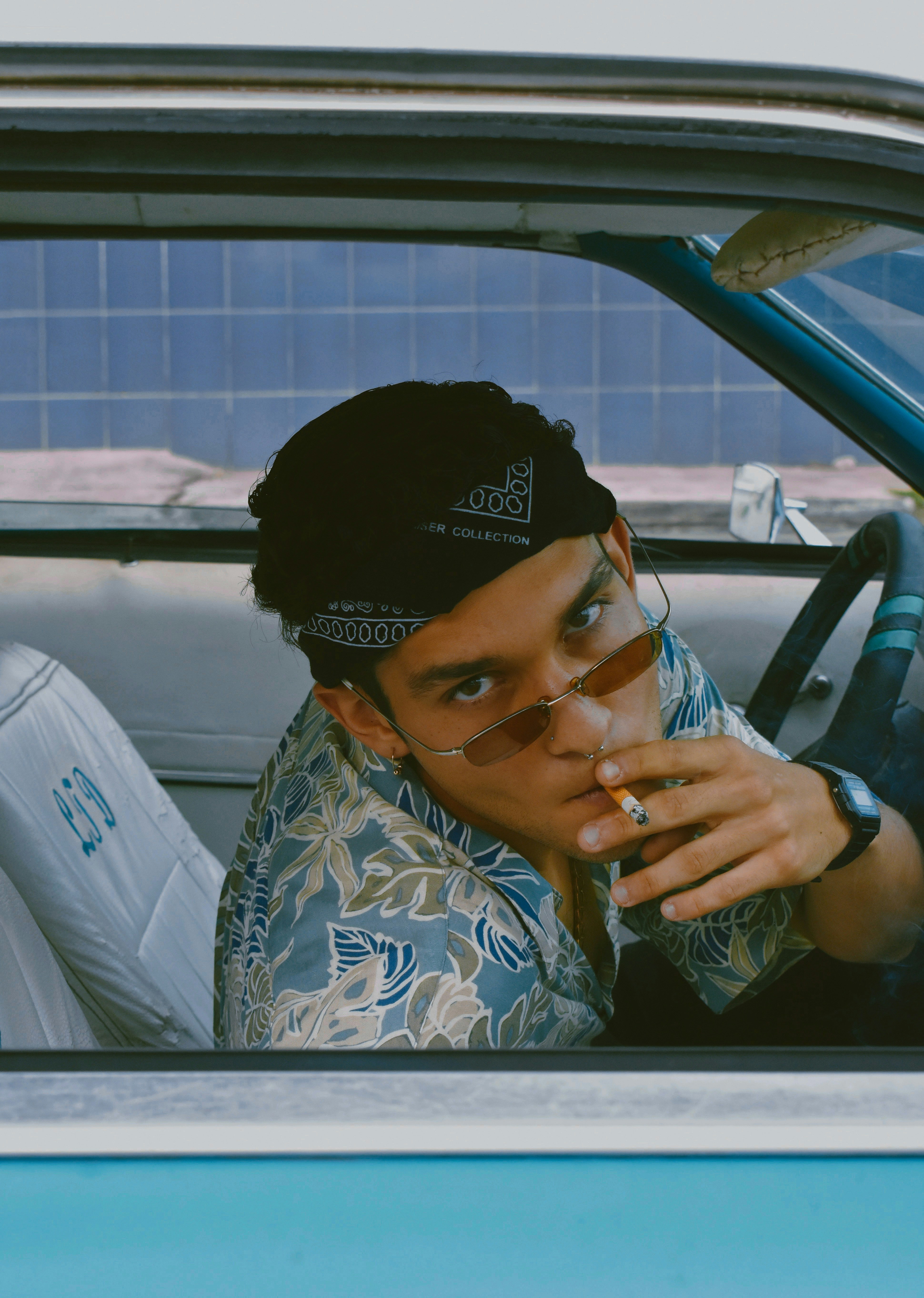 Gaze Through the Window in a Sunlit Blue Coupe
