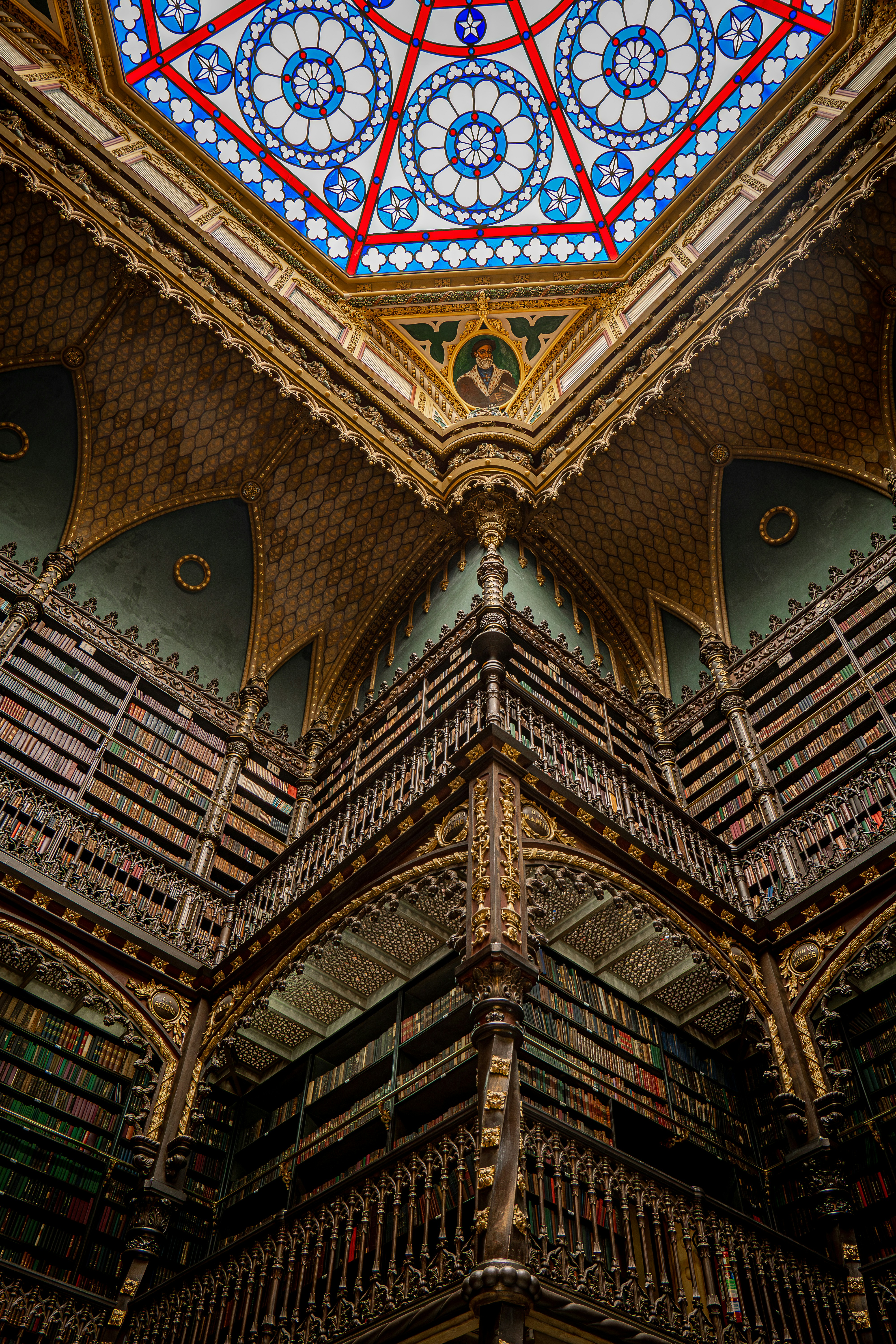 The ceiling of a library with a stained glass skylight photo – Free ...