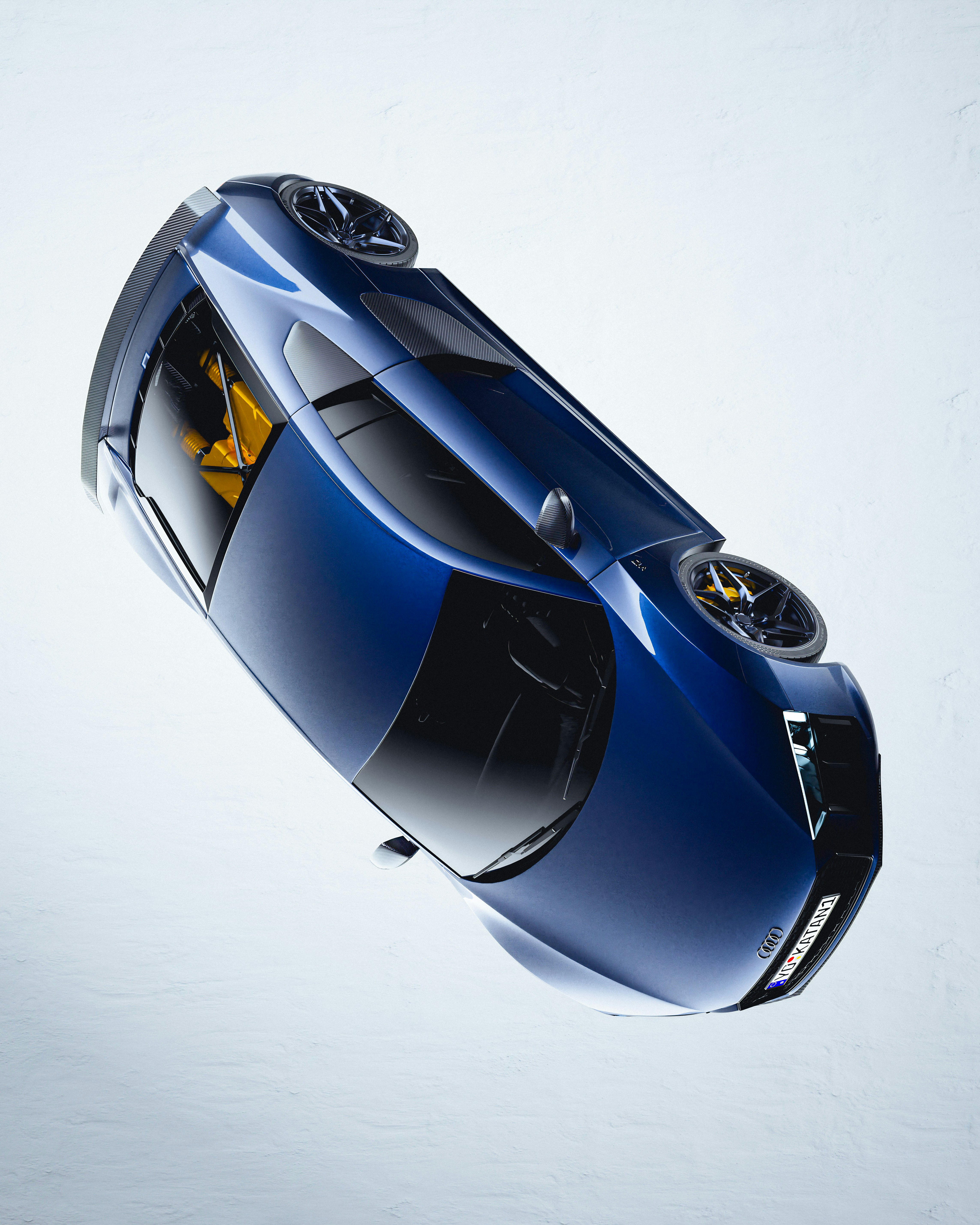 A blue sports car flying through the air photo – Free Car Image on Unsplash