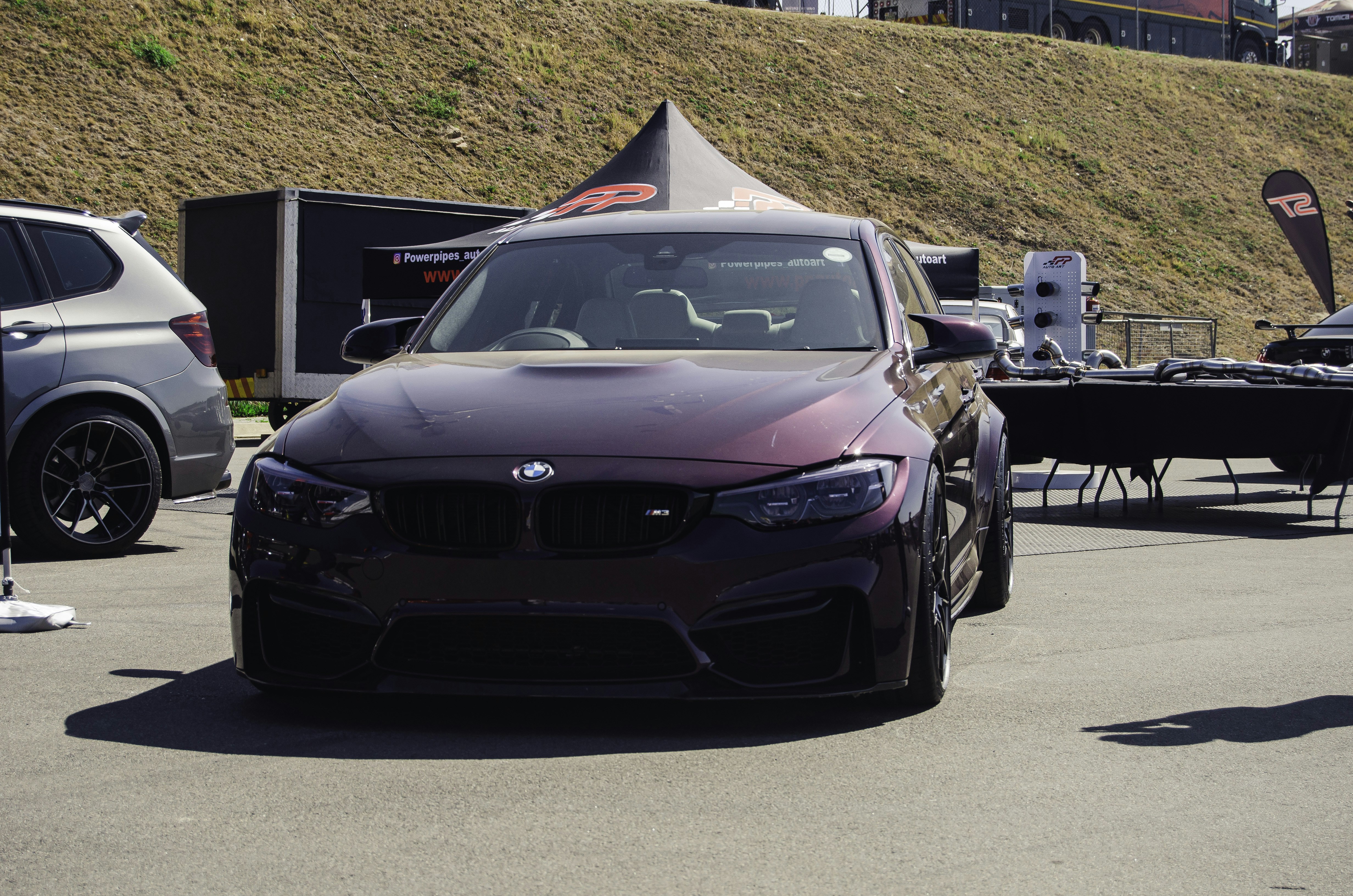 Midnight M-Performance Stance at Car Show: Aggressive Front View