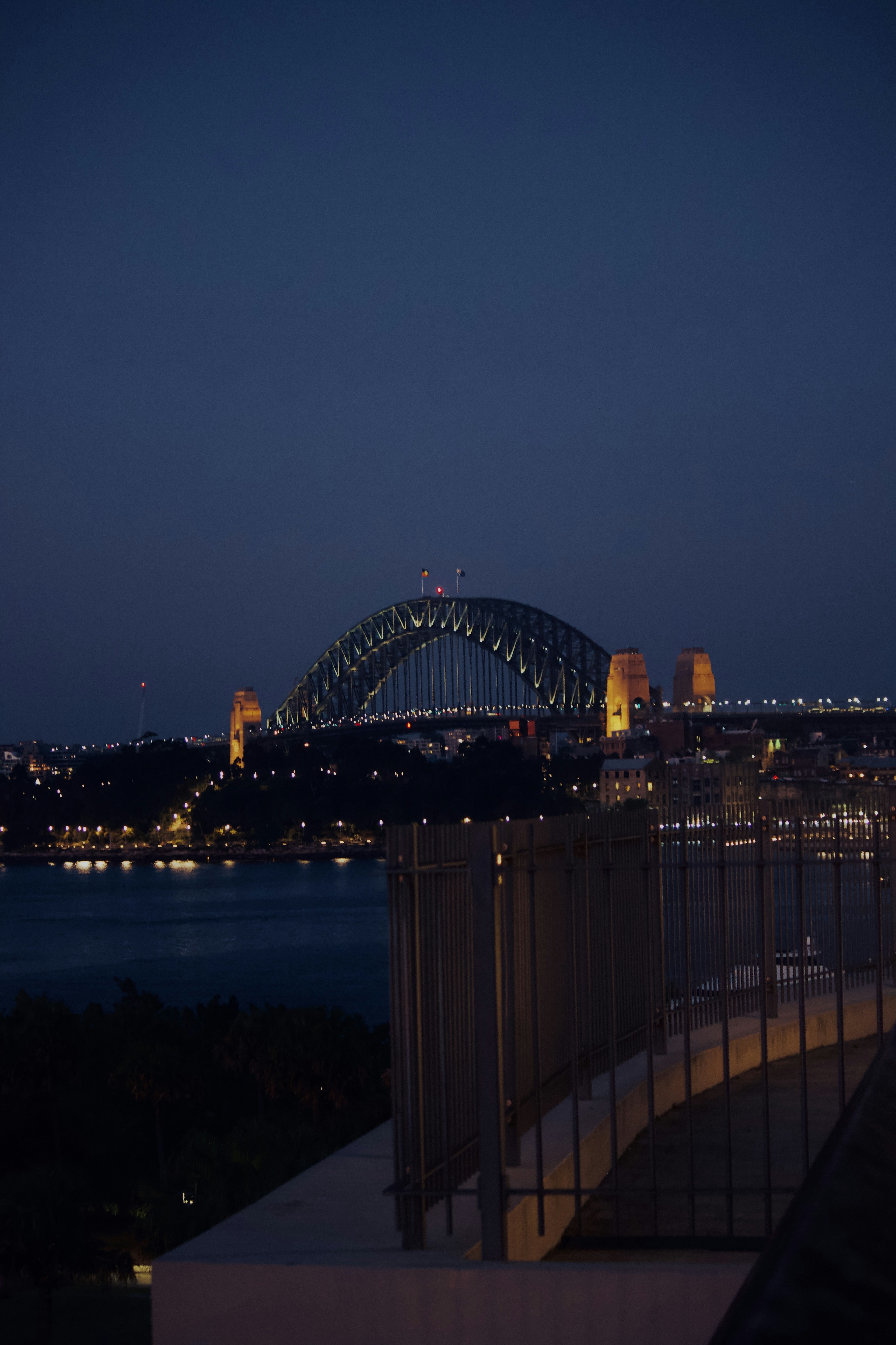 A night view of a bridge over a body of water photo – Free Architecture ...