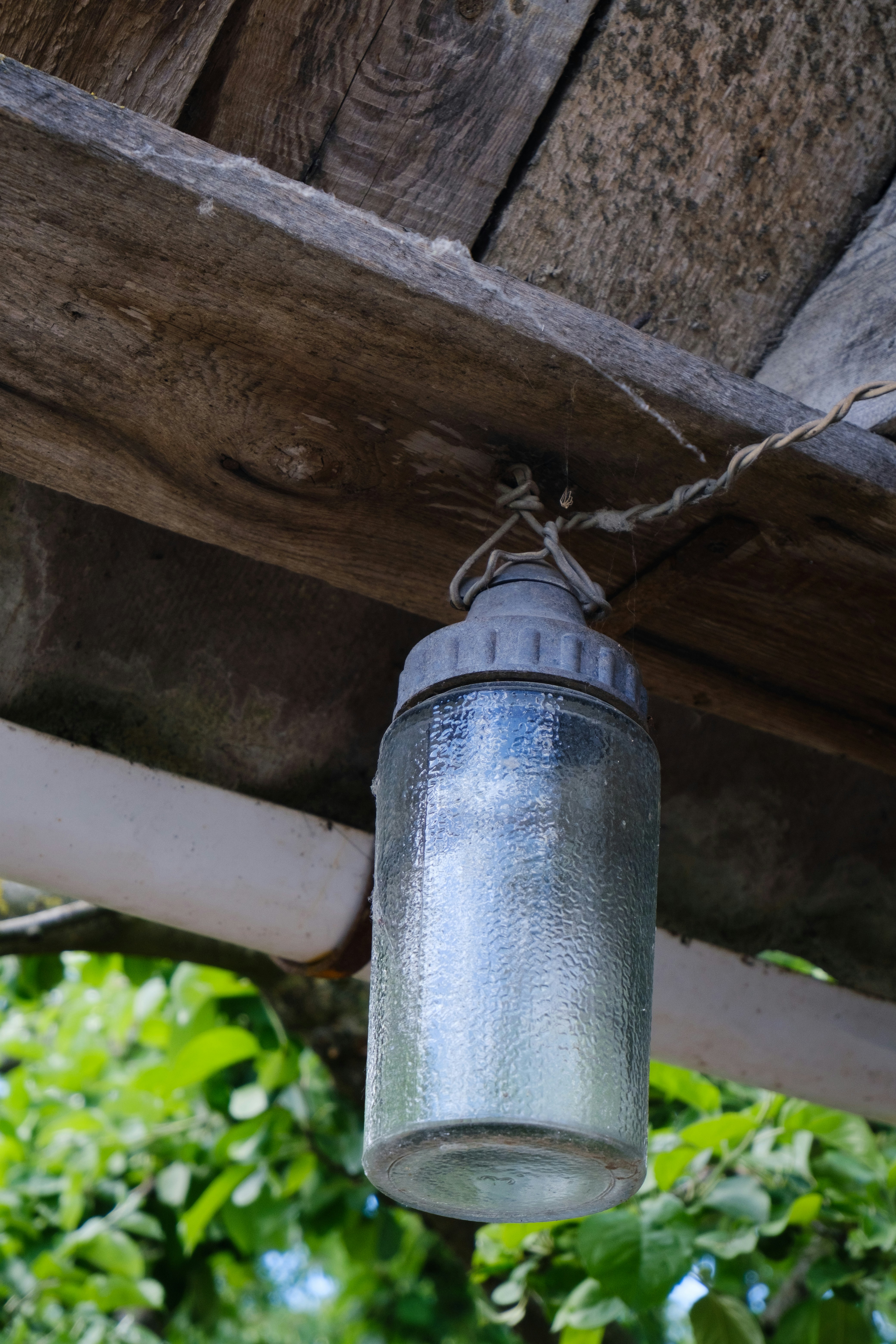 A mason jar hanging from a wooden roof photo – Free Light bulb Image on ...