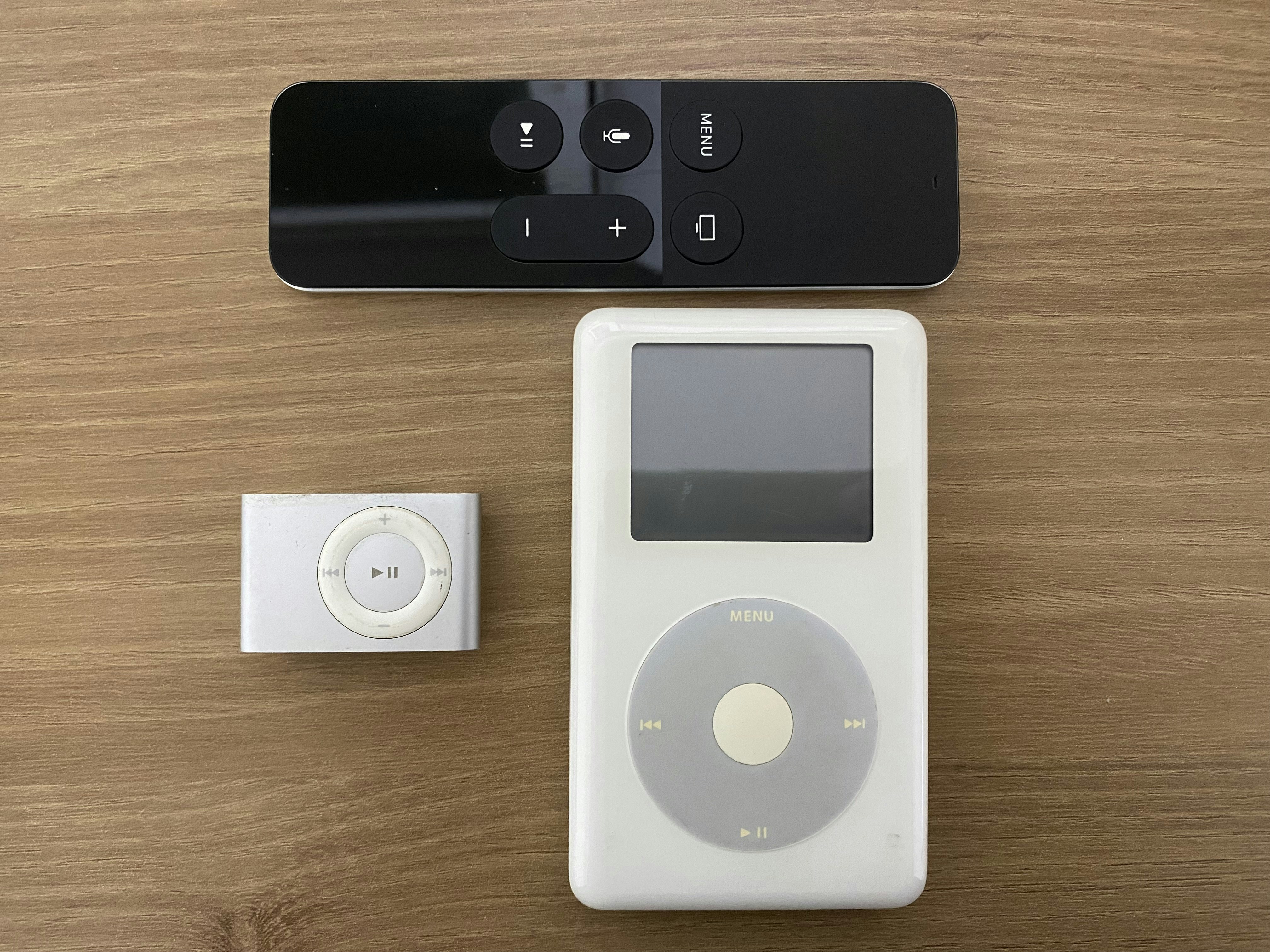 An ipod sitting next to an ipod on a table photo – Free Electronics ...