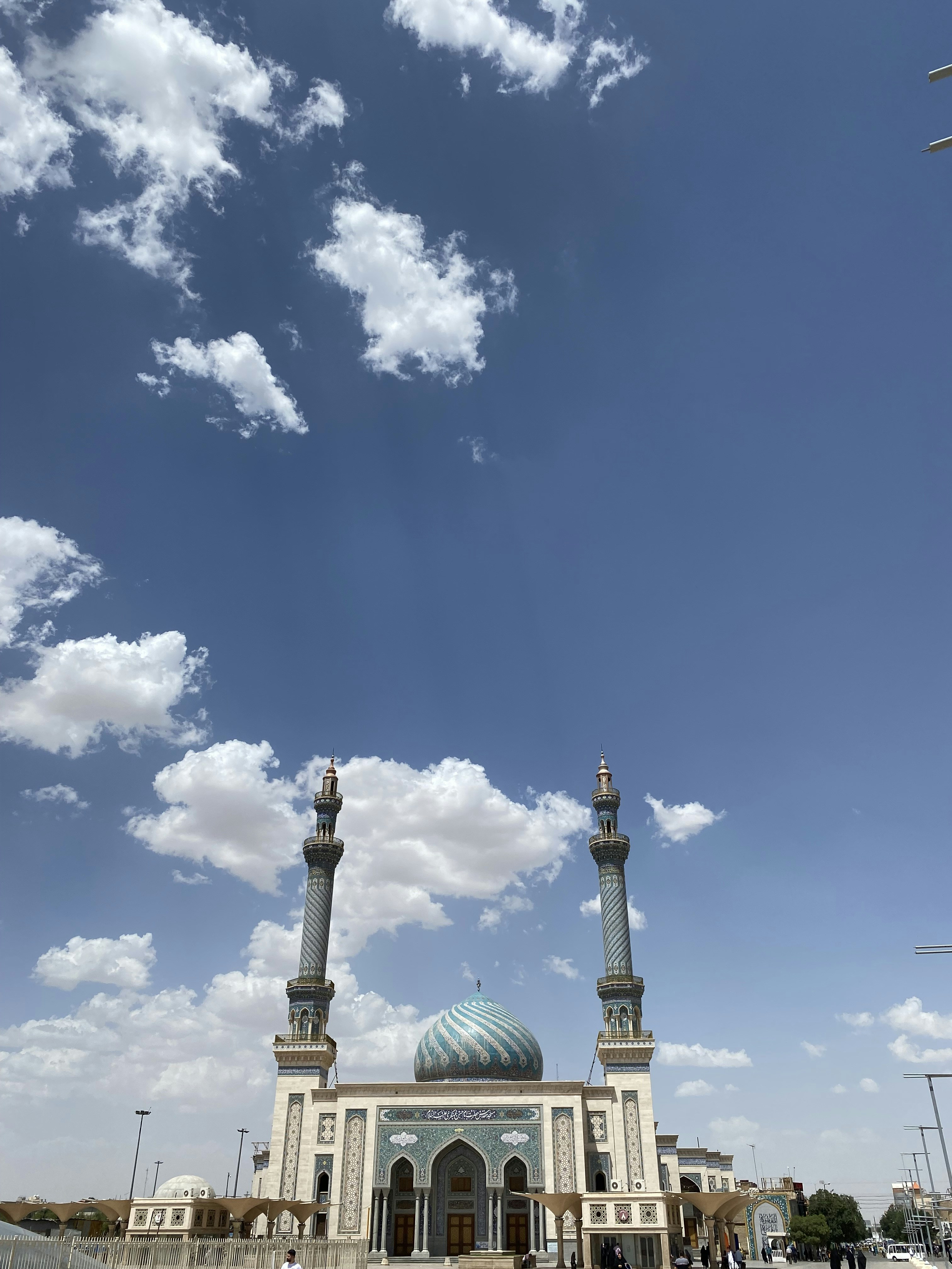 Cerulean Dome and Twin Minarets: A Mosque Framed by Sky