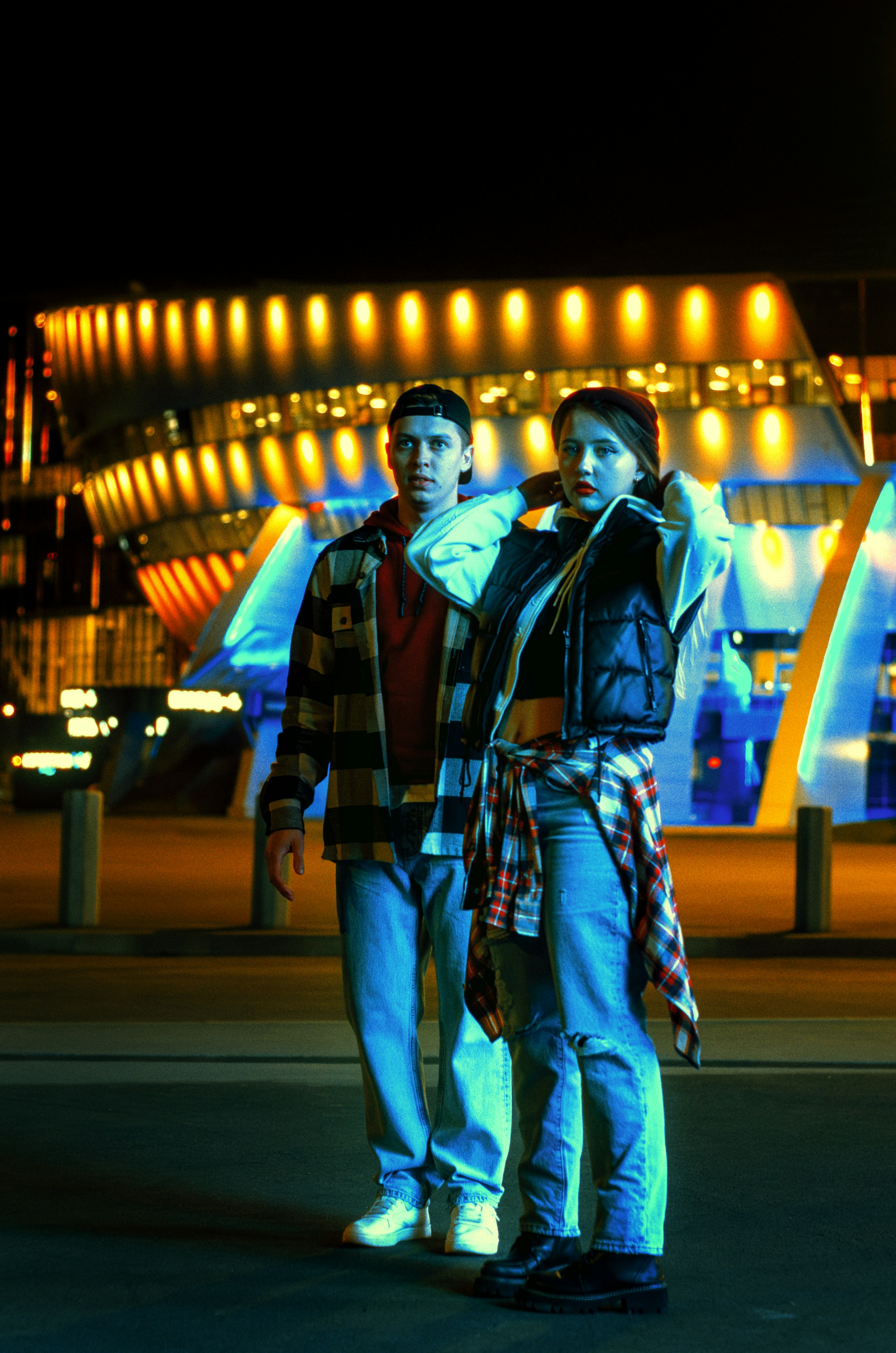 Neon Duo Before a Faceted Nightscape