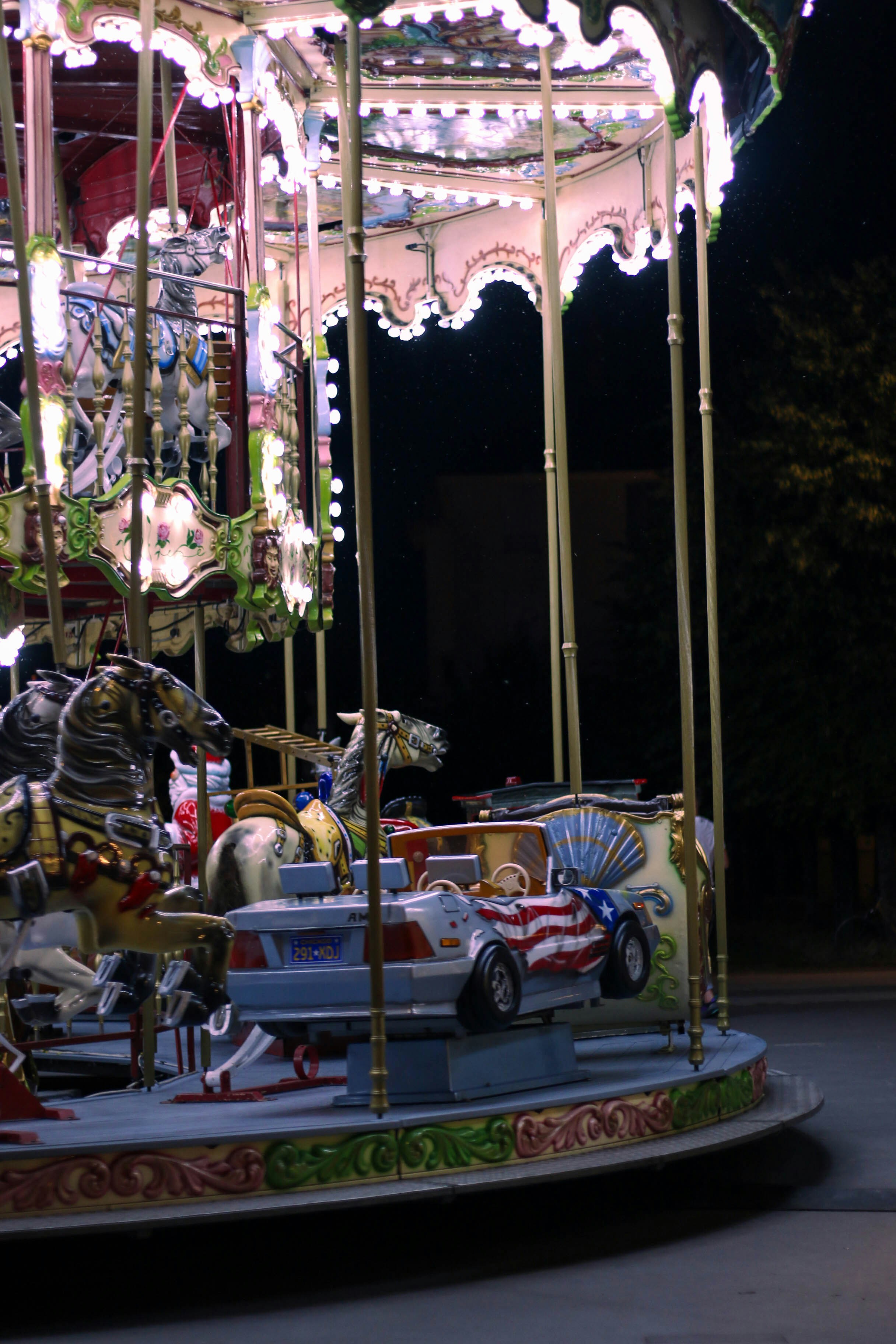 Neon Gallop: Night Carousel Sparks Painted Horses