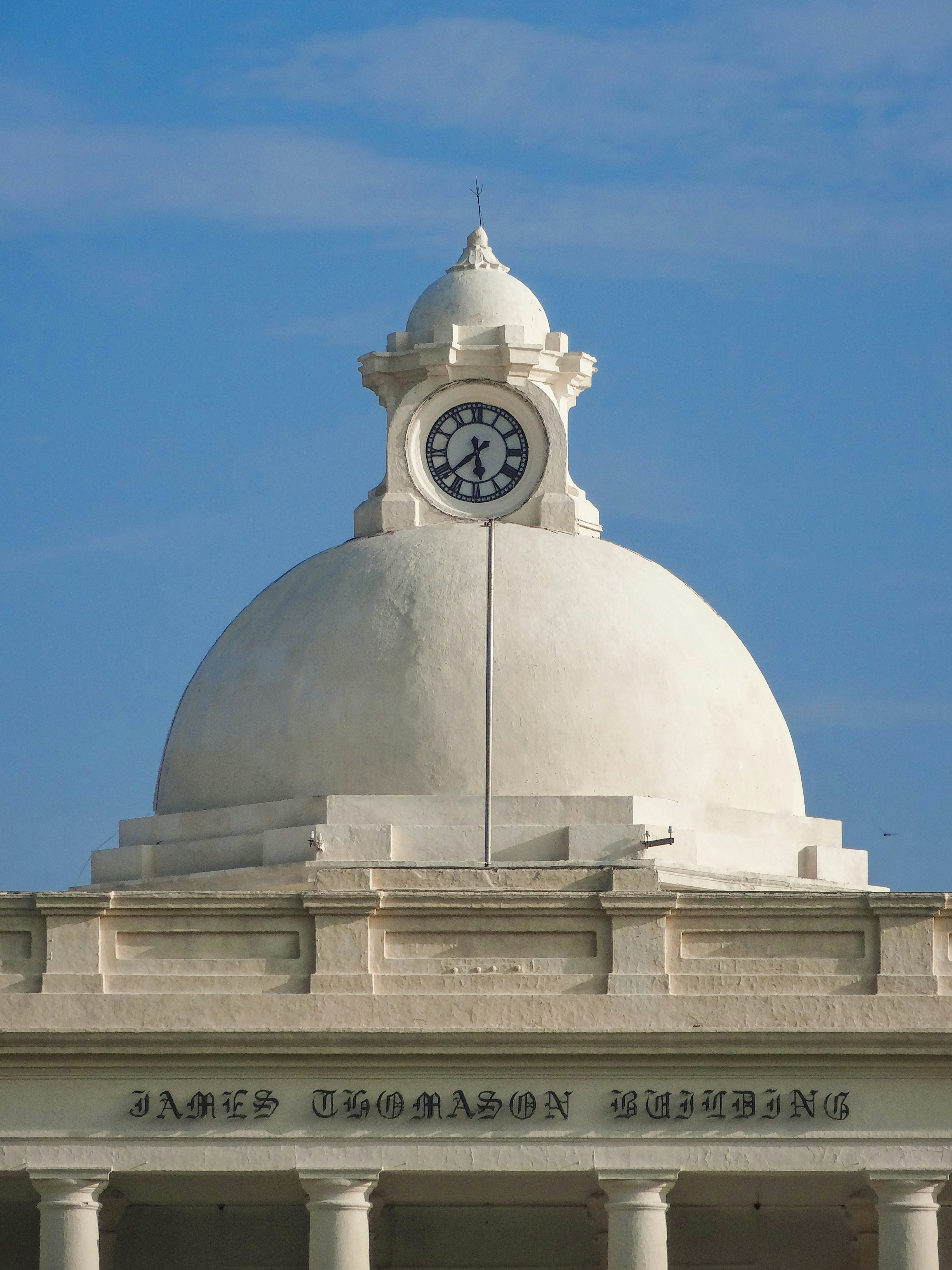 A large white dome with a clock on top photo – Free James thomason ...
