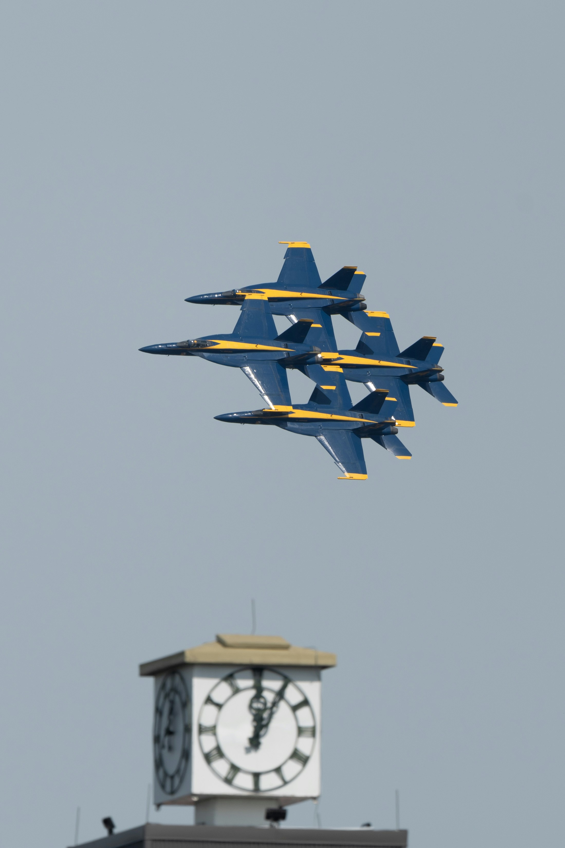 A group of fighter jets flying over a clock tower photo – Free Animal ...