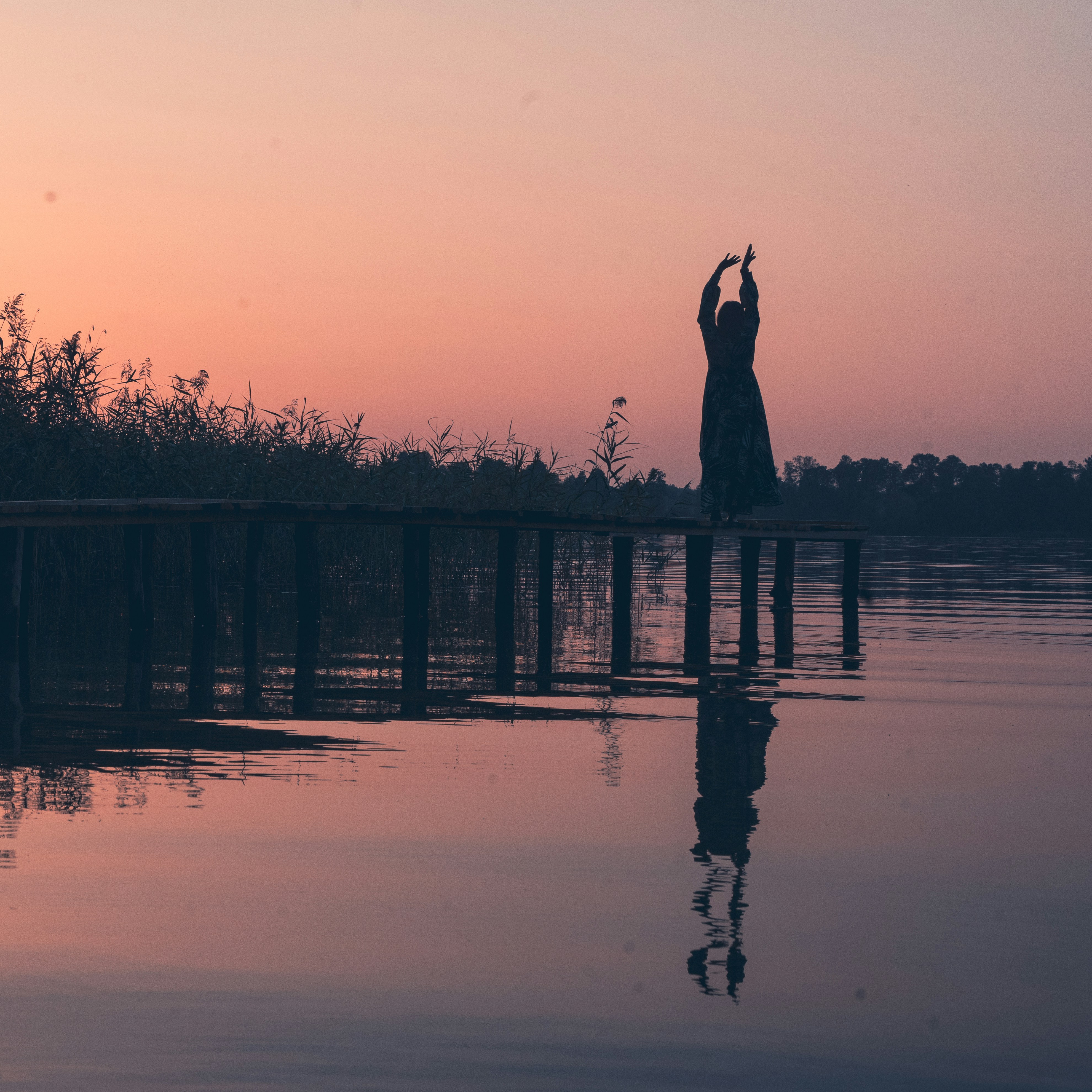 Silhouette on the Dusk Pier