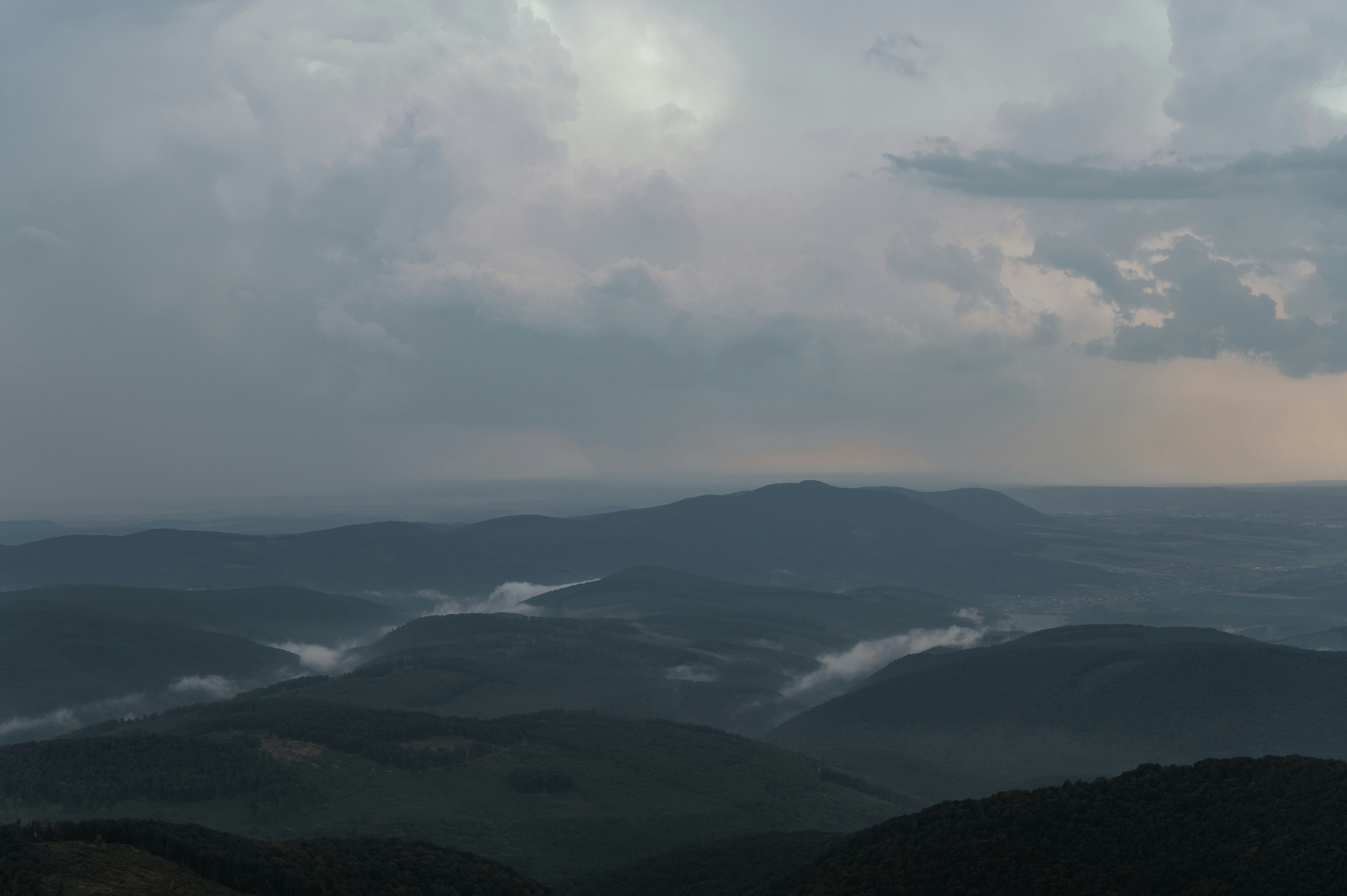 A view of a mountain range with clouds in the sky photo – Free Hungary ...