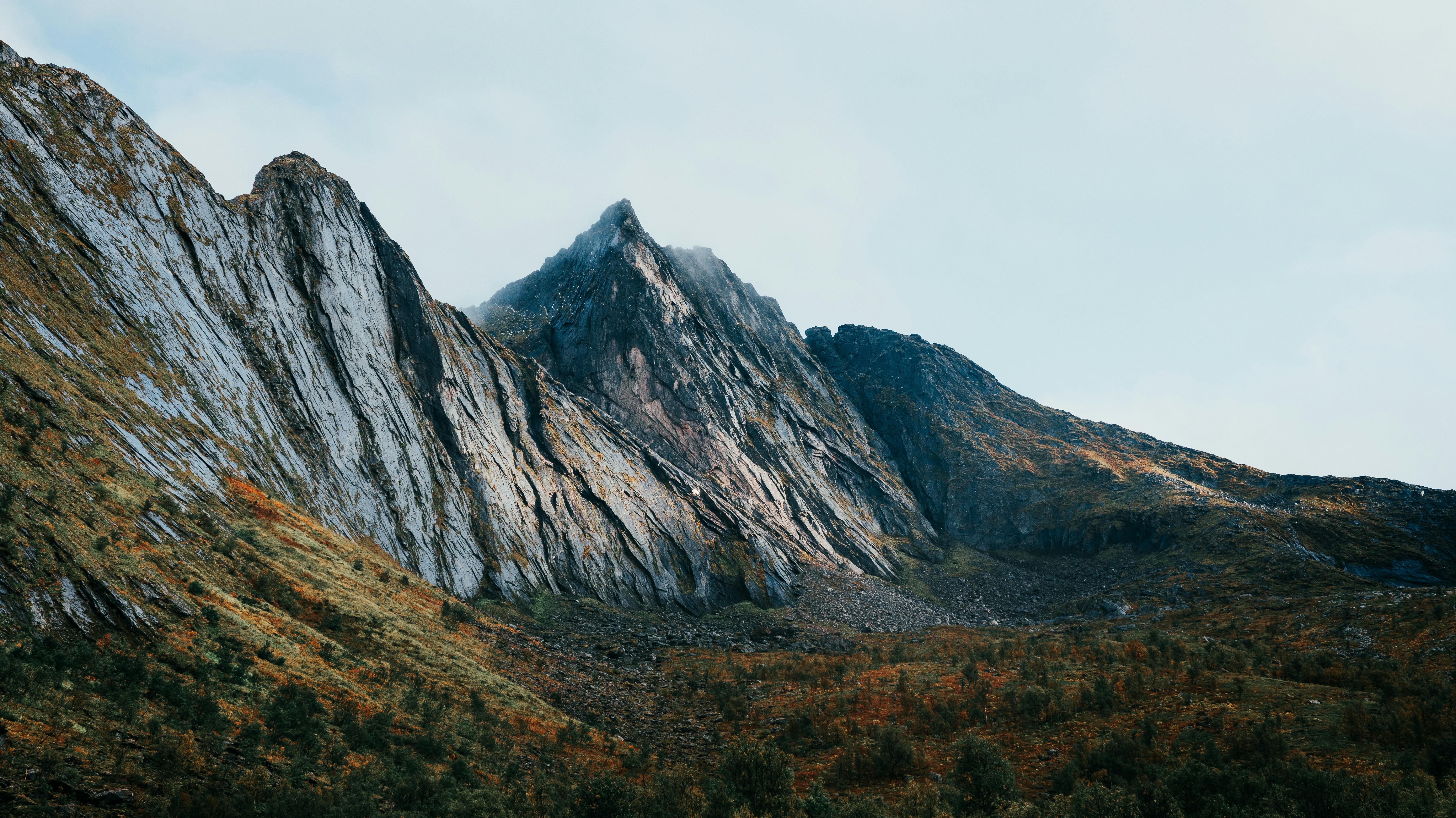 Rugged Ridge in Autumn Light: Slate Peaks and Russet Slopes