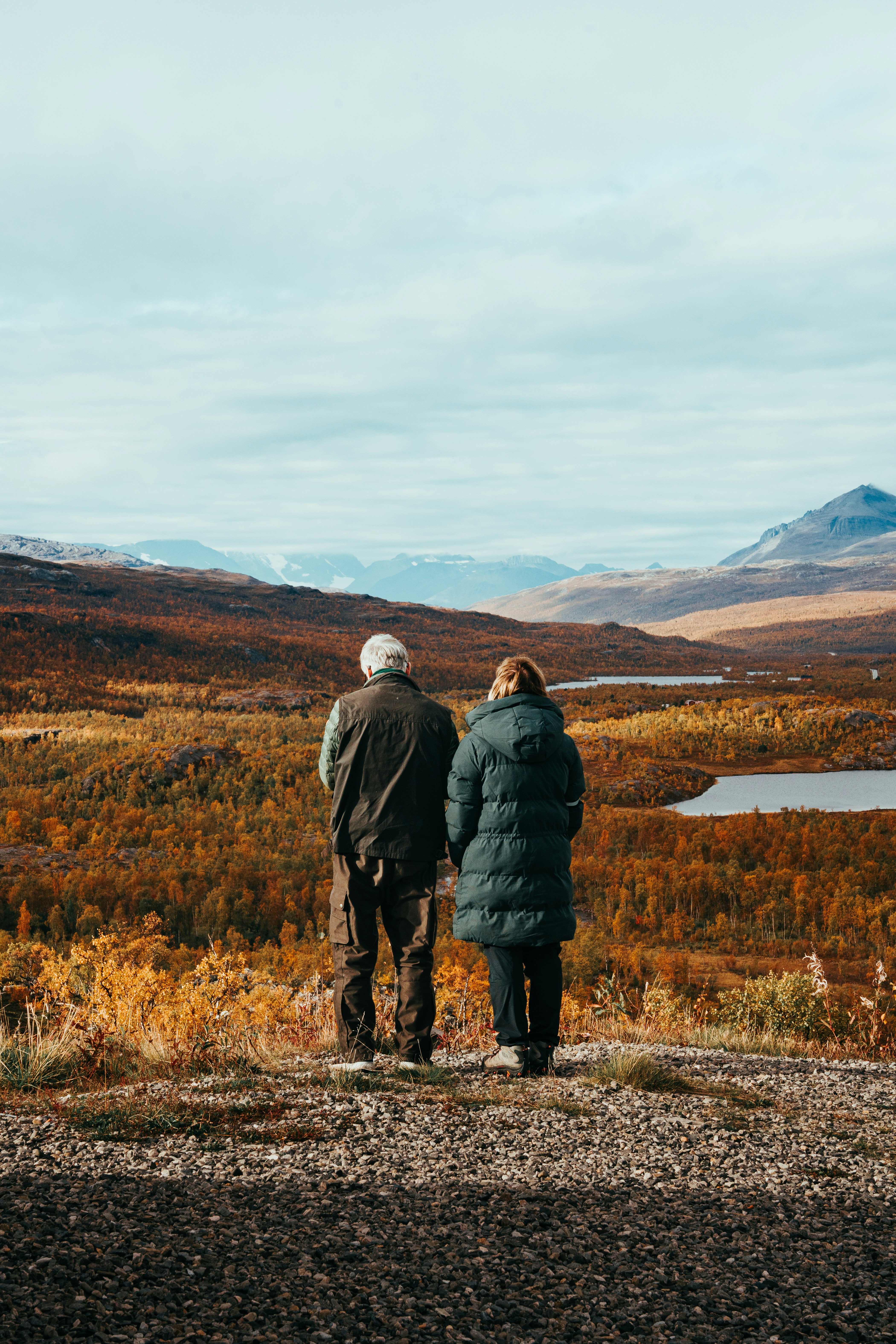 Two Wanderers at the Edge of a Golden Valley
