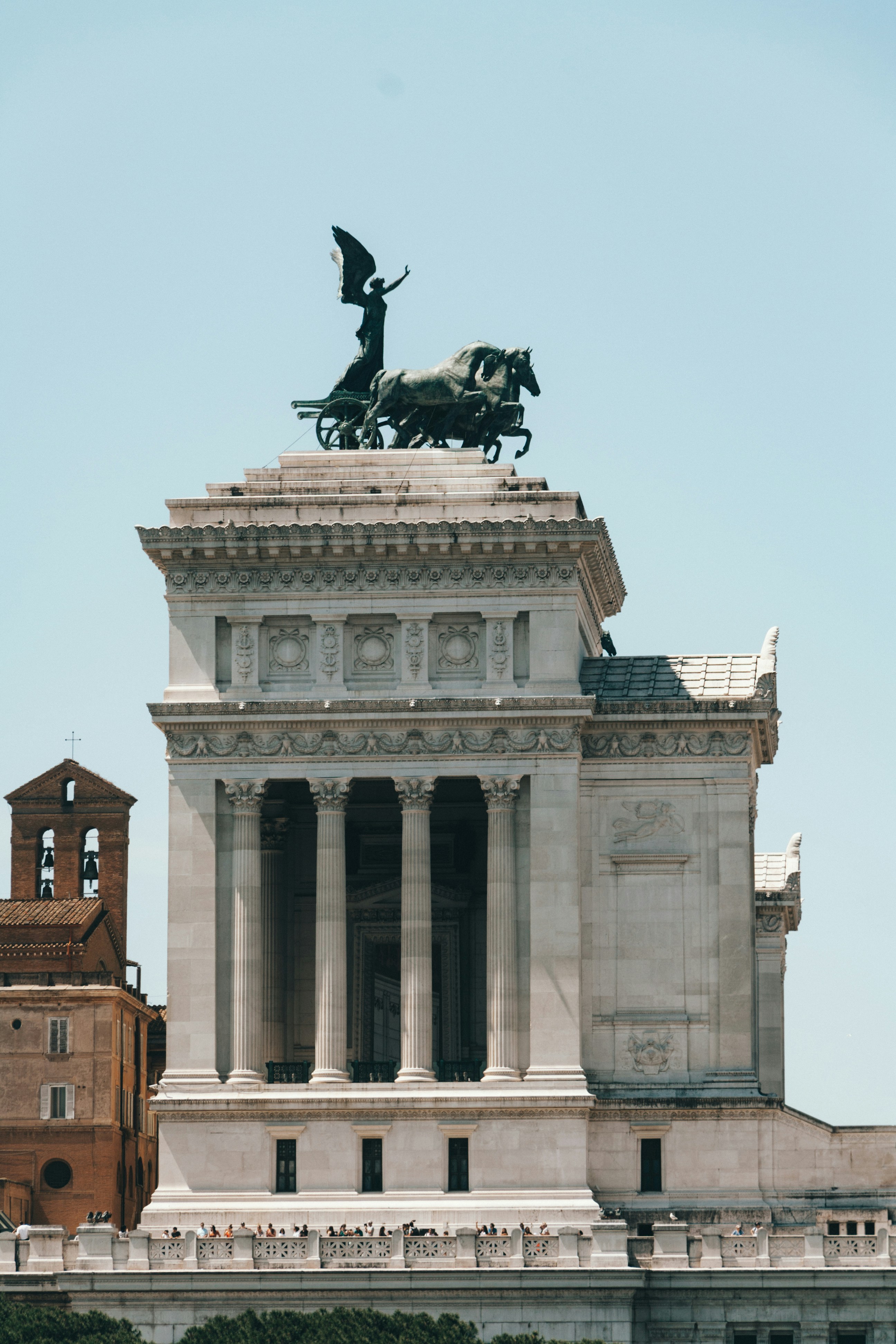 Eagle of Victory: Striding Quadriga atop Marble Grandeur