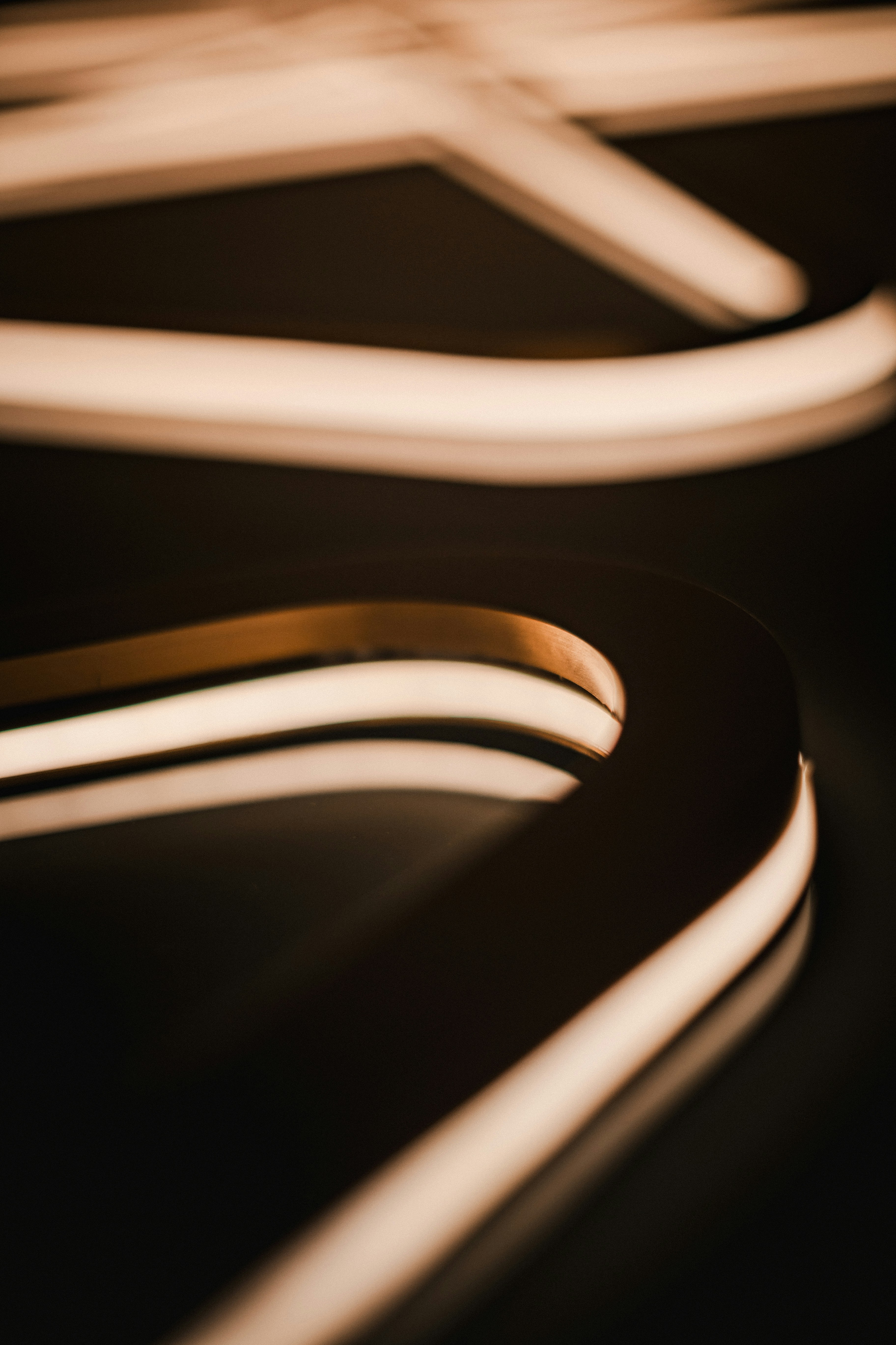 Architectural Rhythm: Soft Neon Curves in Golden Hour
