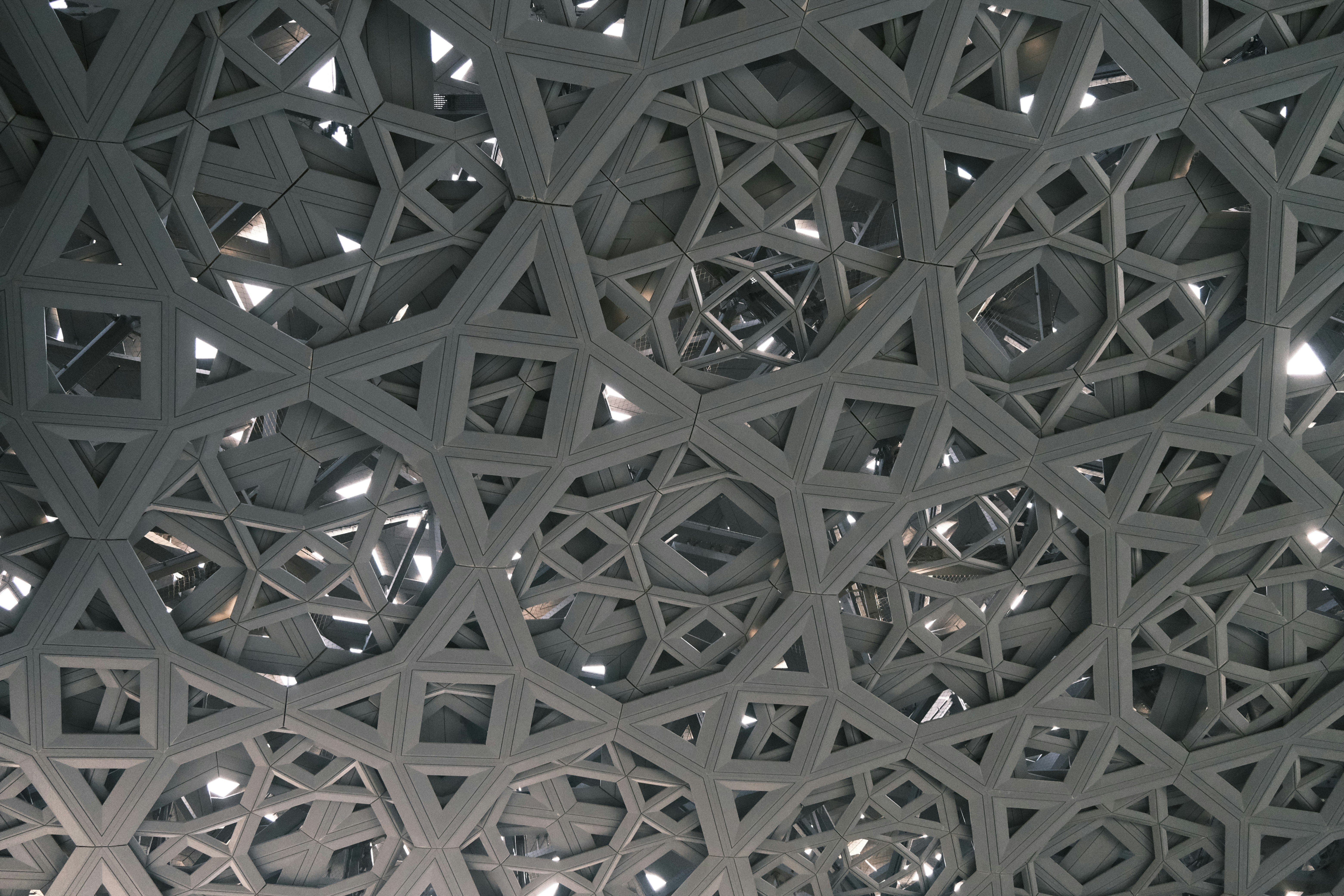 A close up view of a structure made of geometric shapes photo – Free ...
