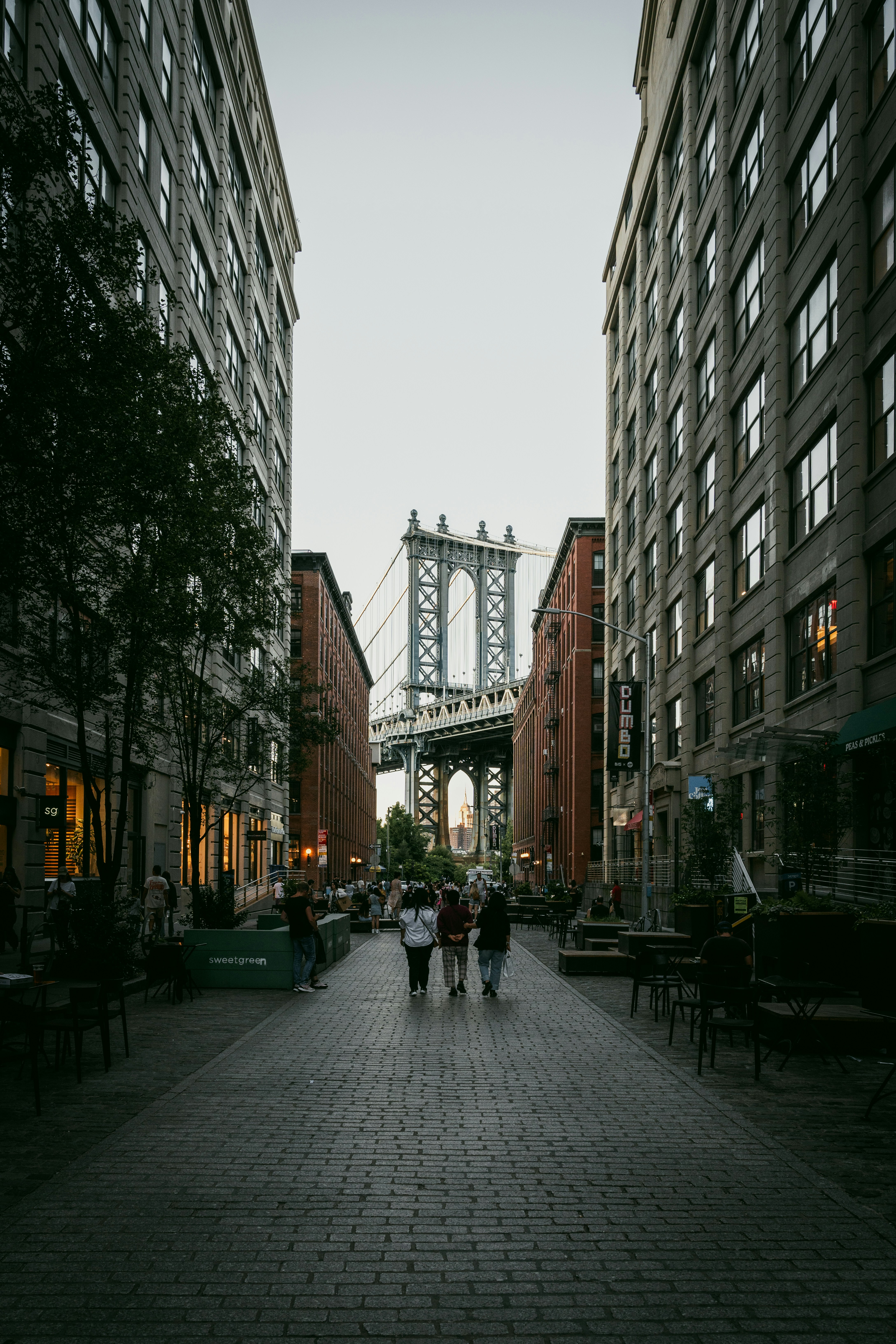 Through a Brick Canyon Toward the Distant Steel Arc
