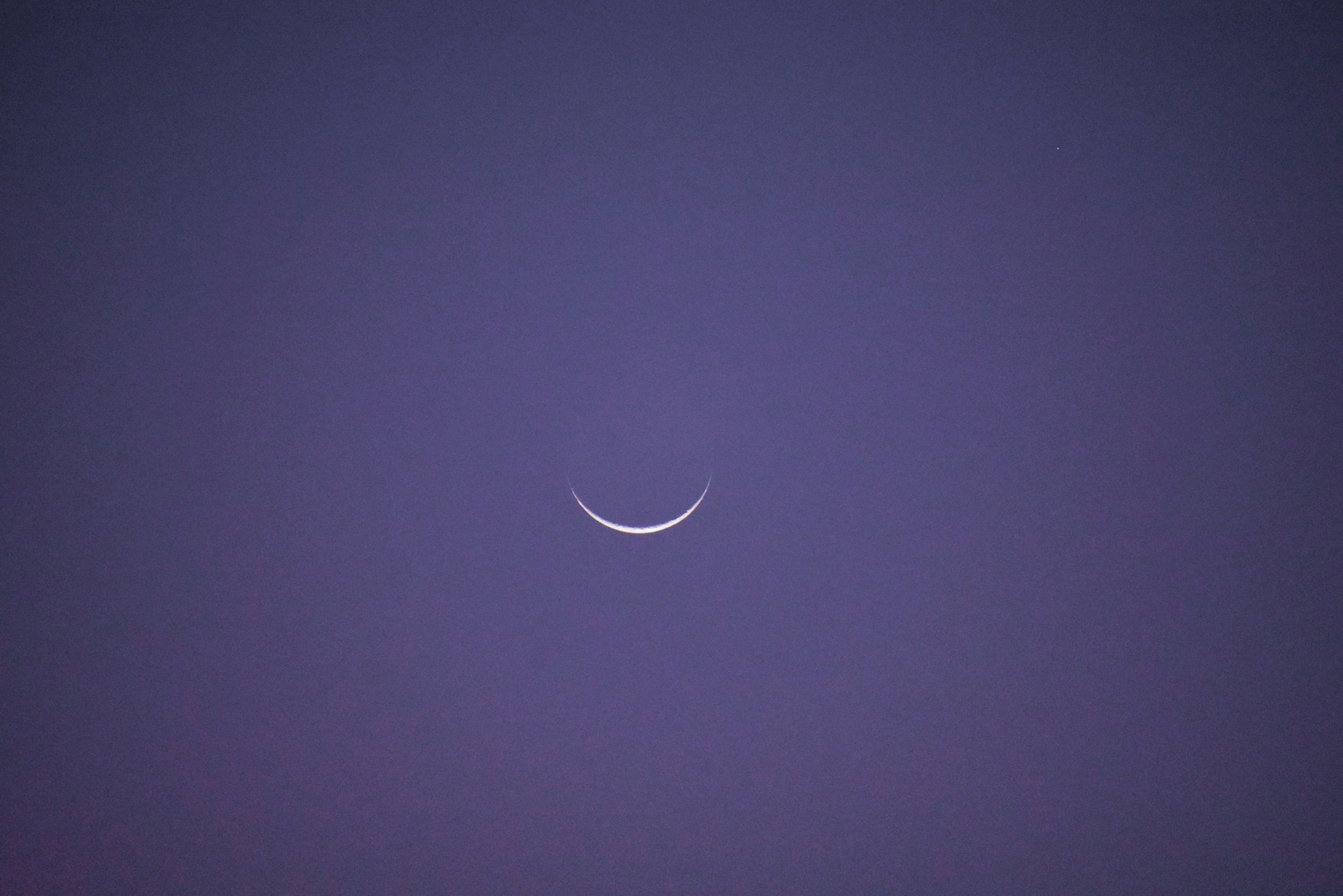 Sliver Between Twilight: A Violet Night Crescent