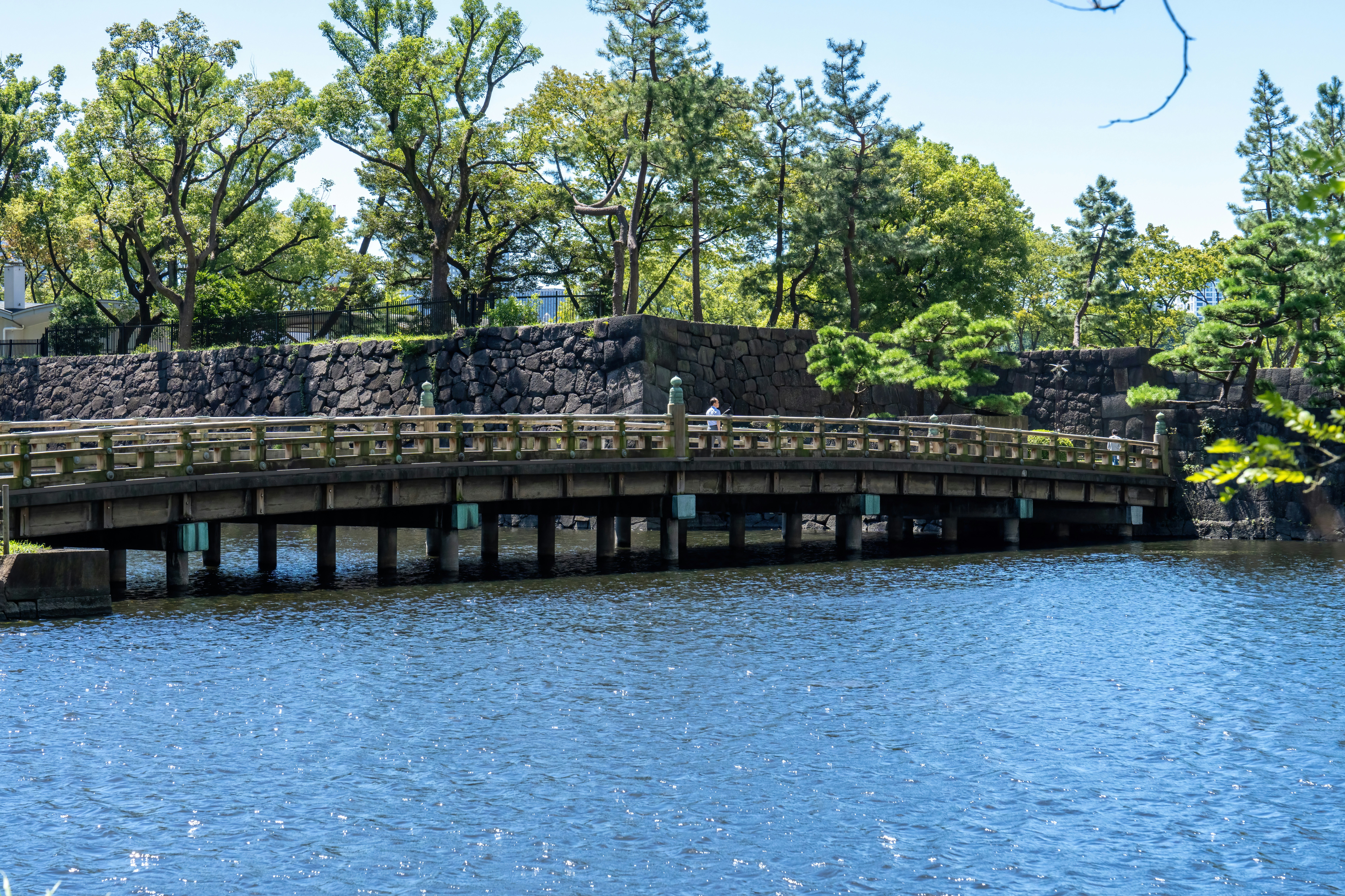 a wooden bridge over a body of water