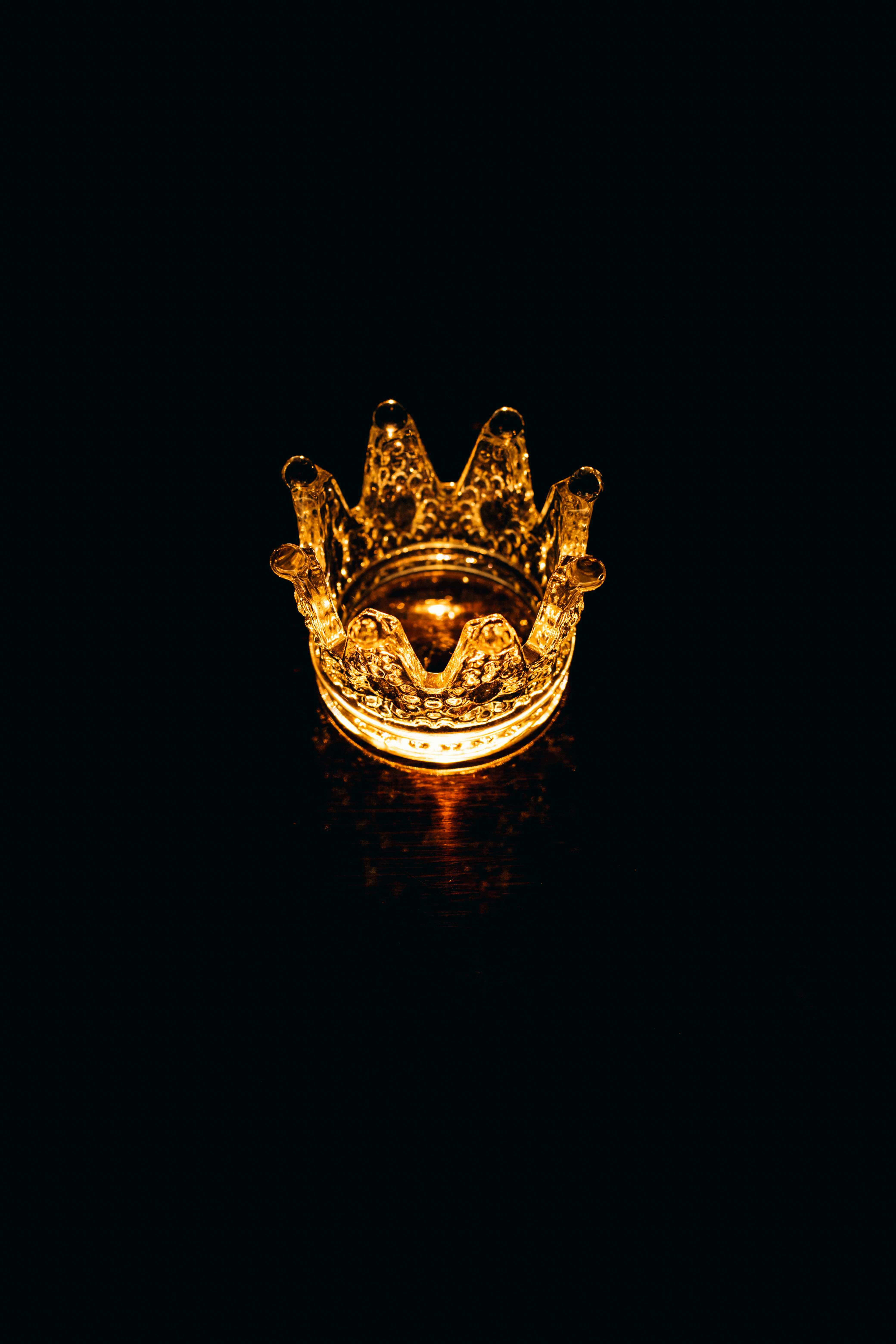 a gold crown sitting on top of a table