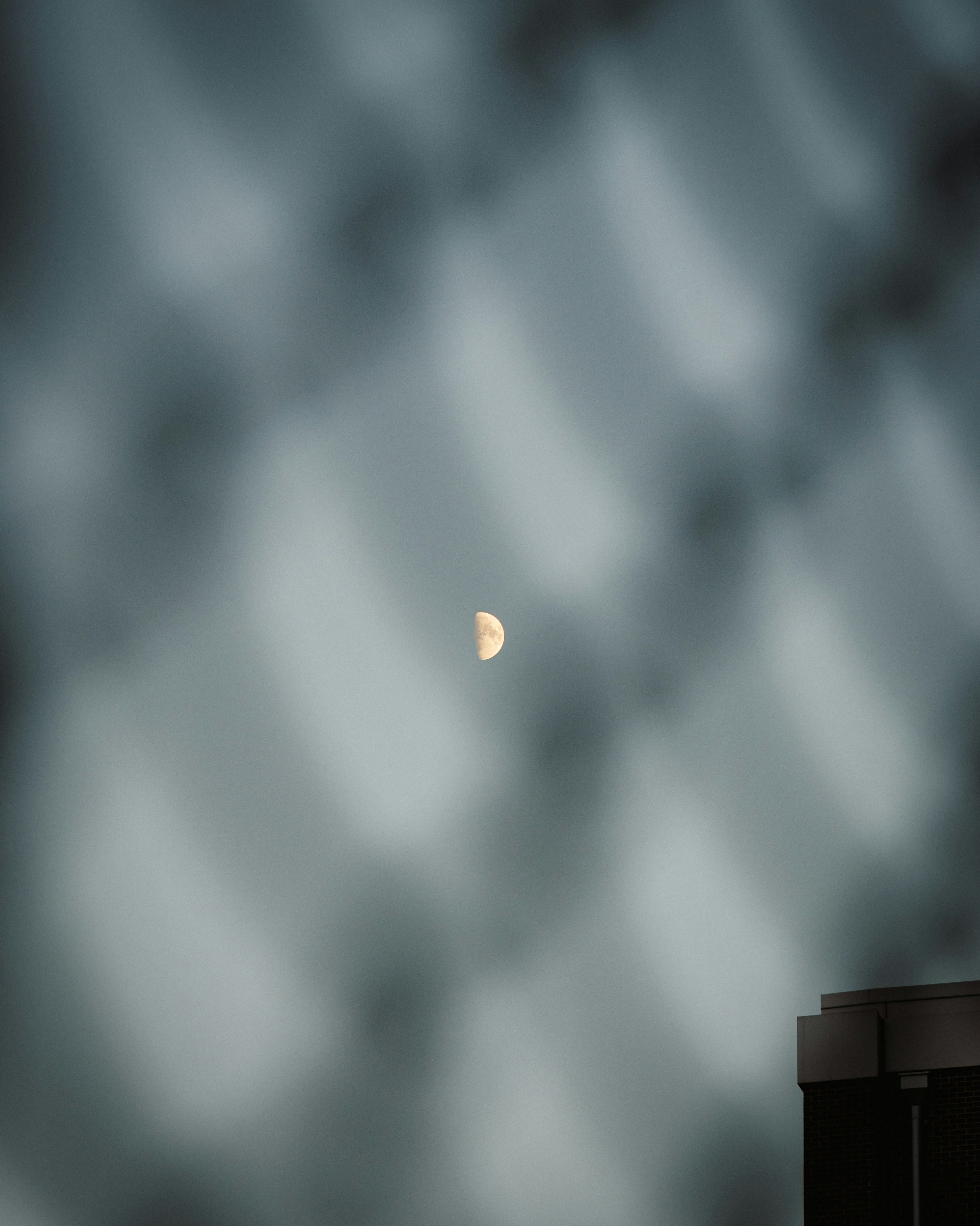 A view of the moon through a cloudy sky photo – Free Atlanta Image on ...