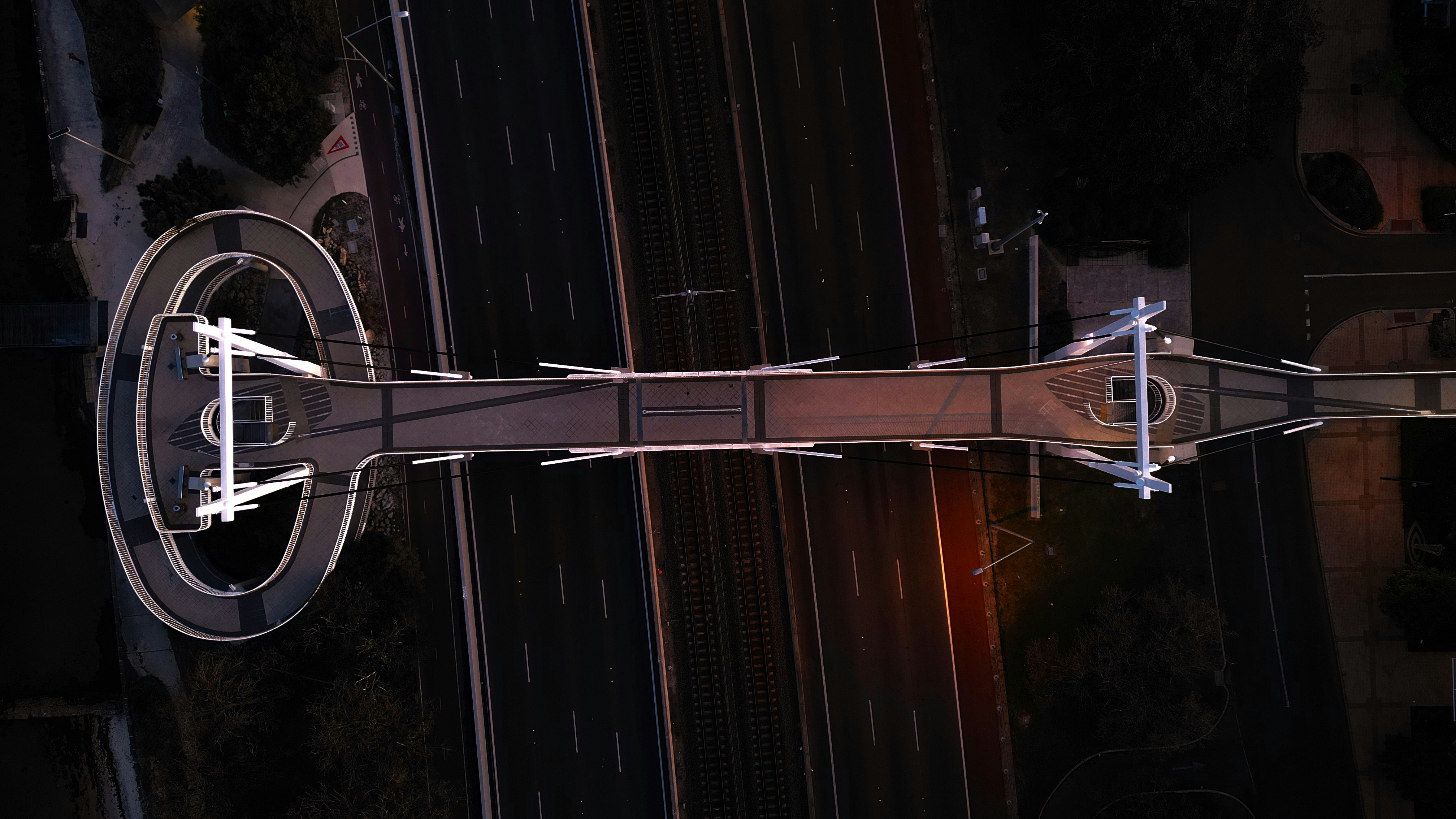 Circular Tower Bridge: Aerial Geometry Over a Busy Highway