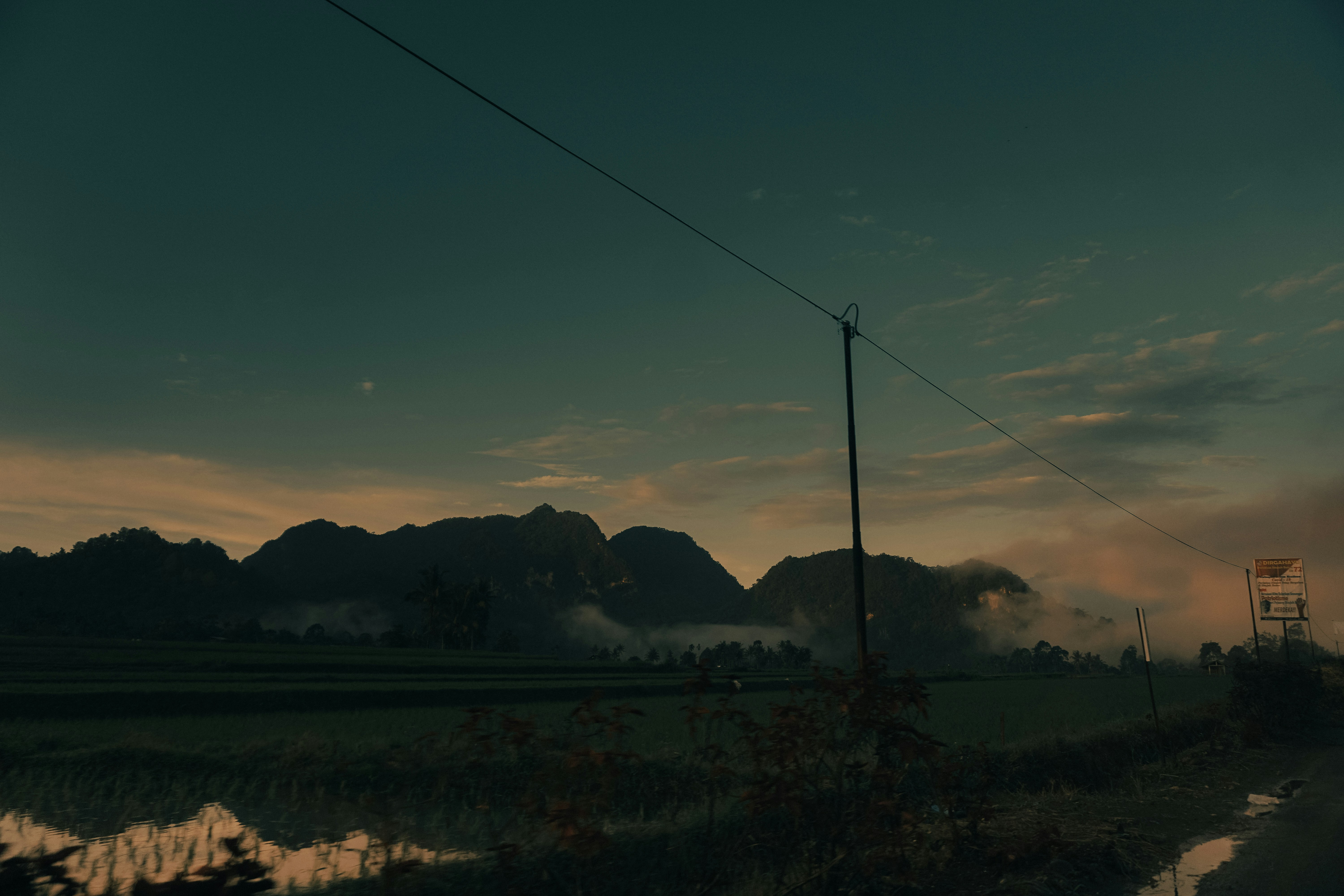 Twilight Shadows Over Mountain Silhouettes