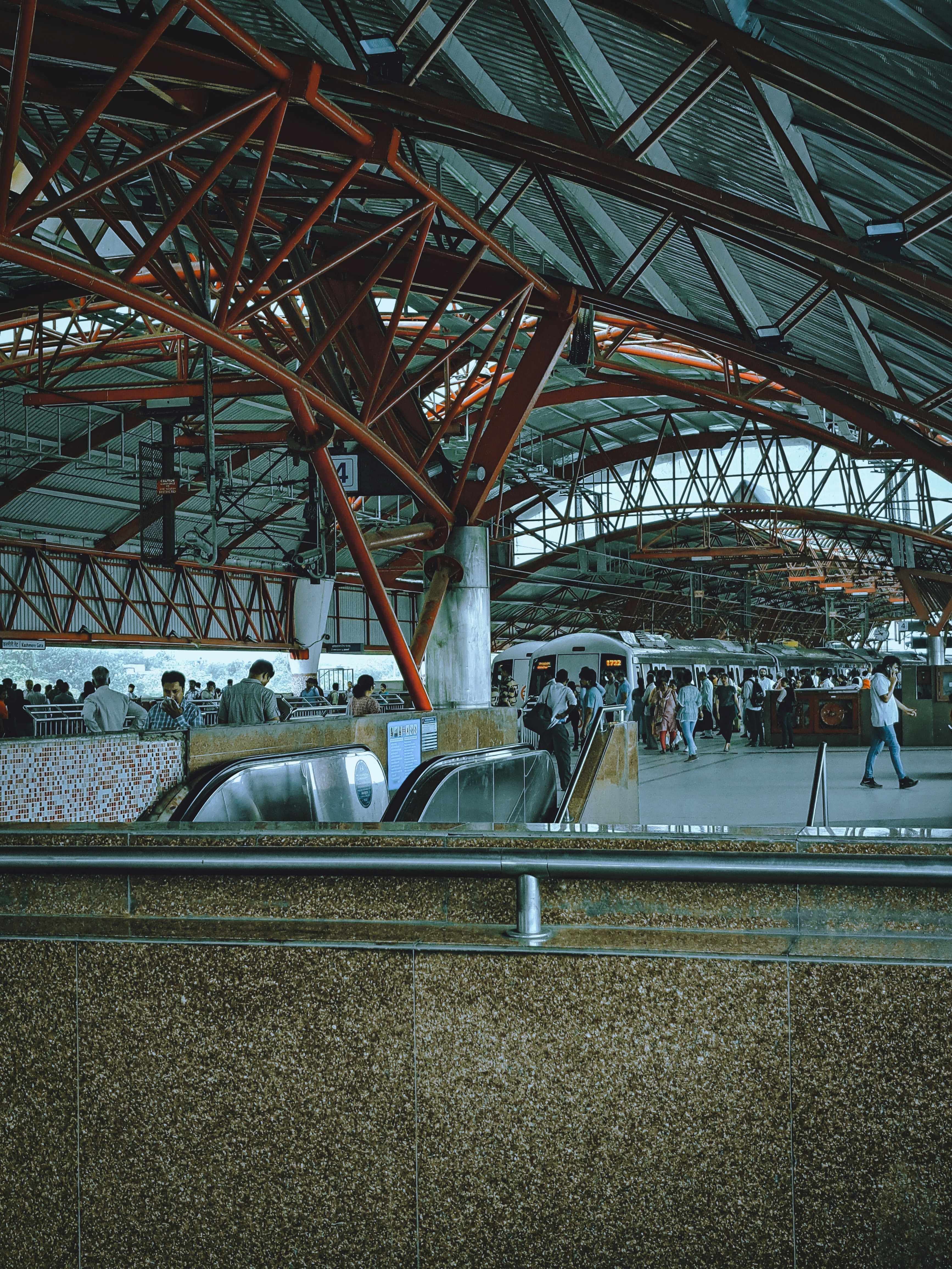 Iron Lattice Cathedral Over a Busy Transit Hall