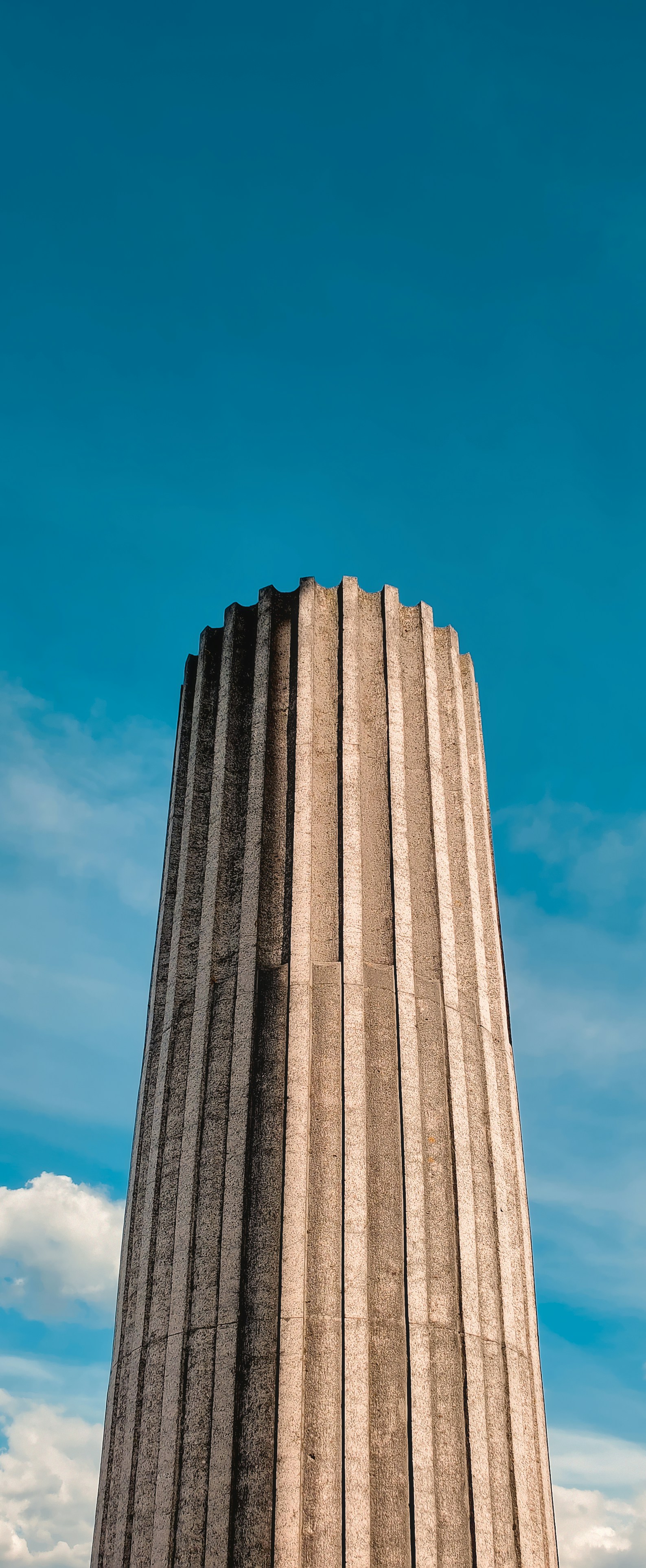Fluted Colossus Against a Cerulean Sky