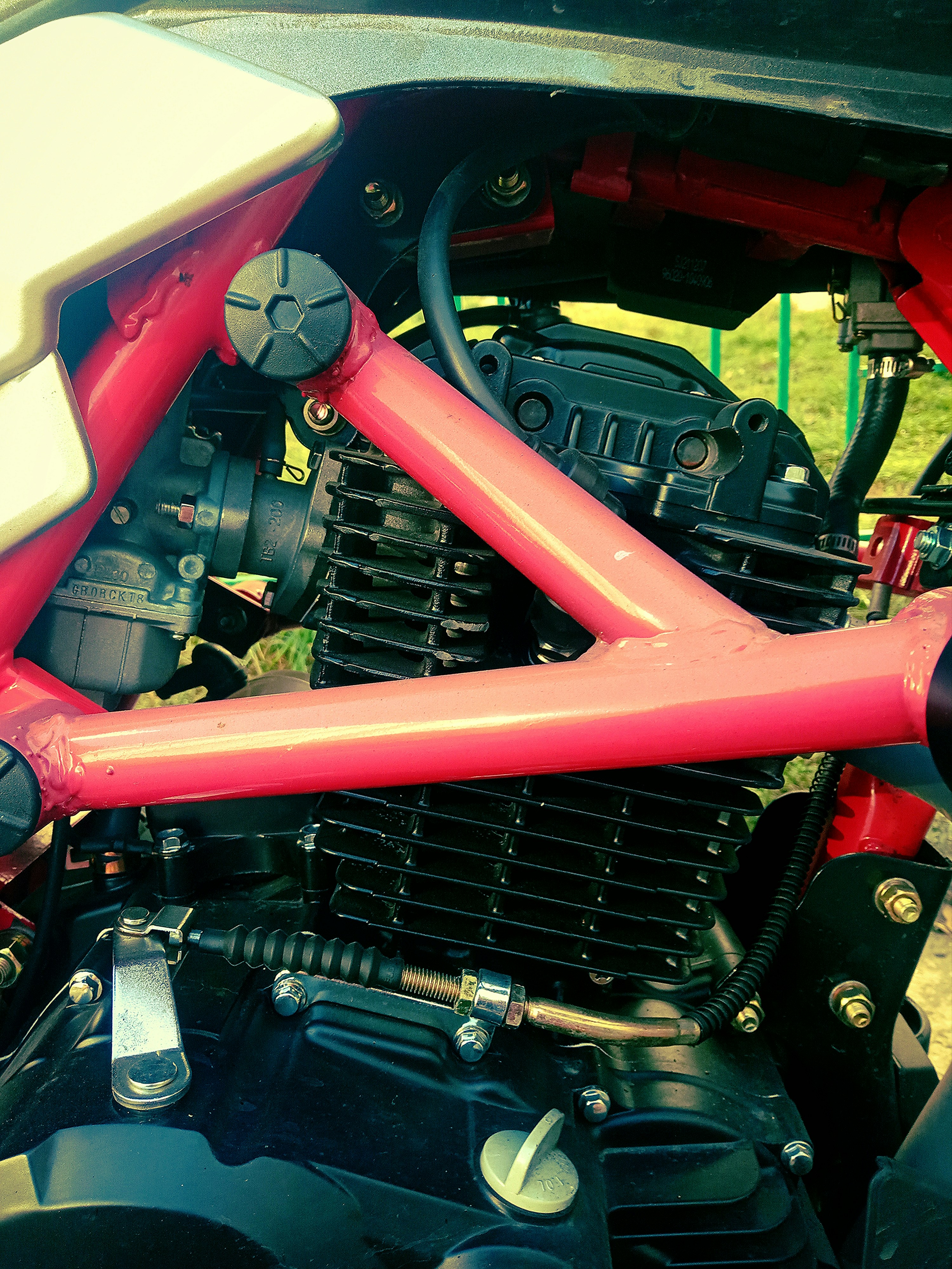 A close up of a red motorcycle engine photo – Free Kursk Image on Unsplash