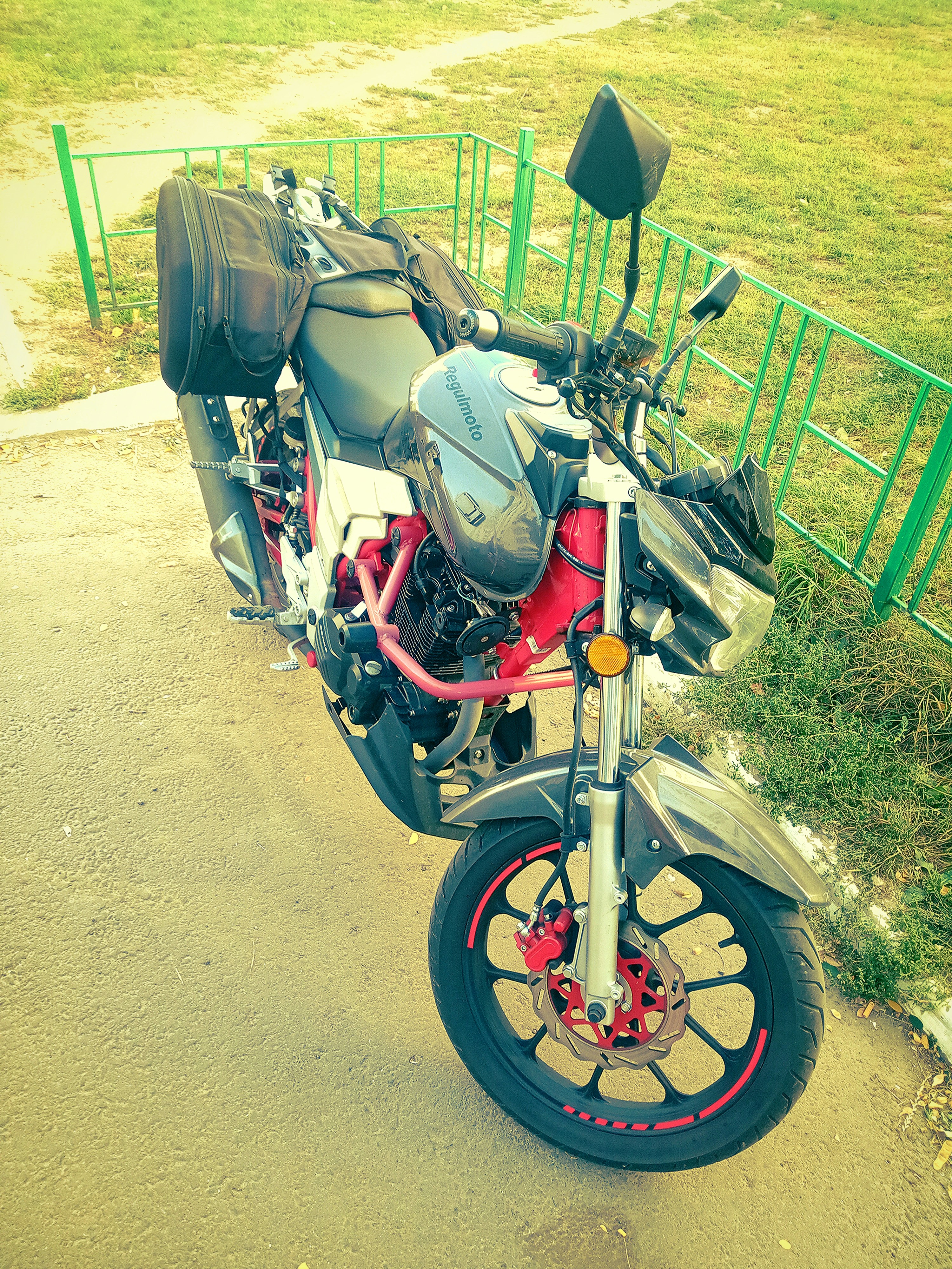 a motorcycle parked on the side of a road