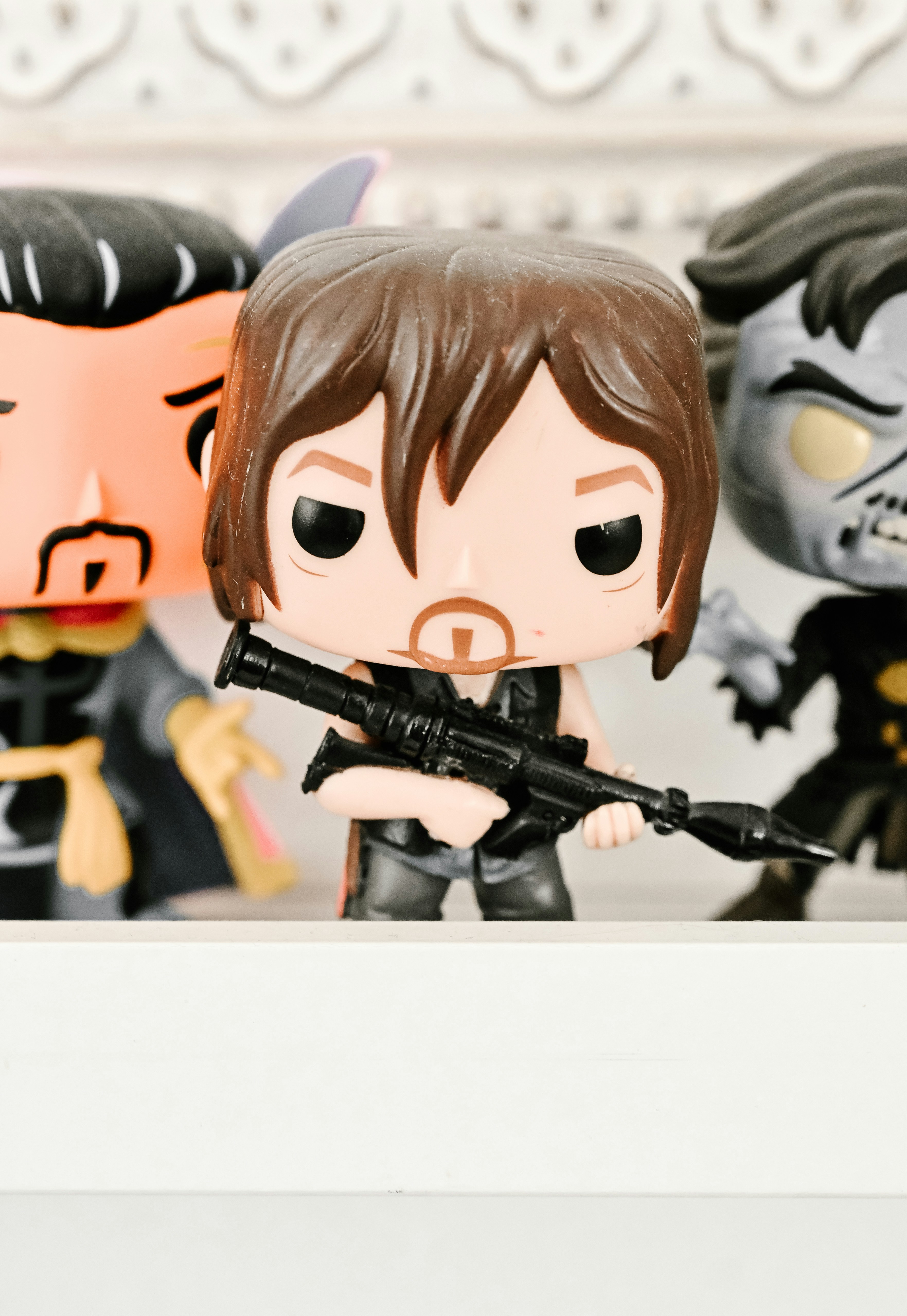 Miniature Guardians of the Shelf