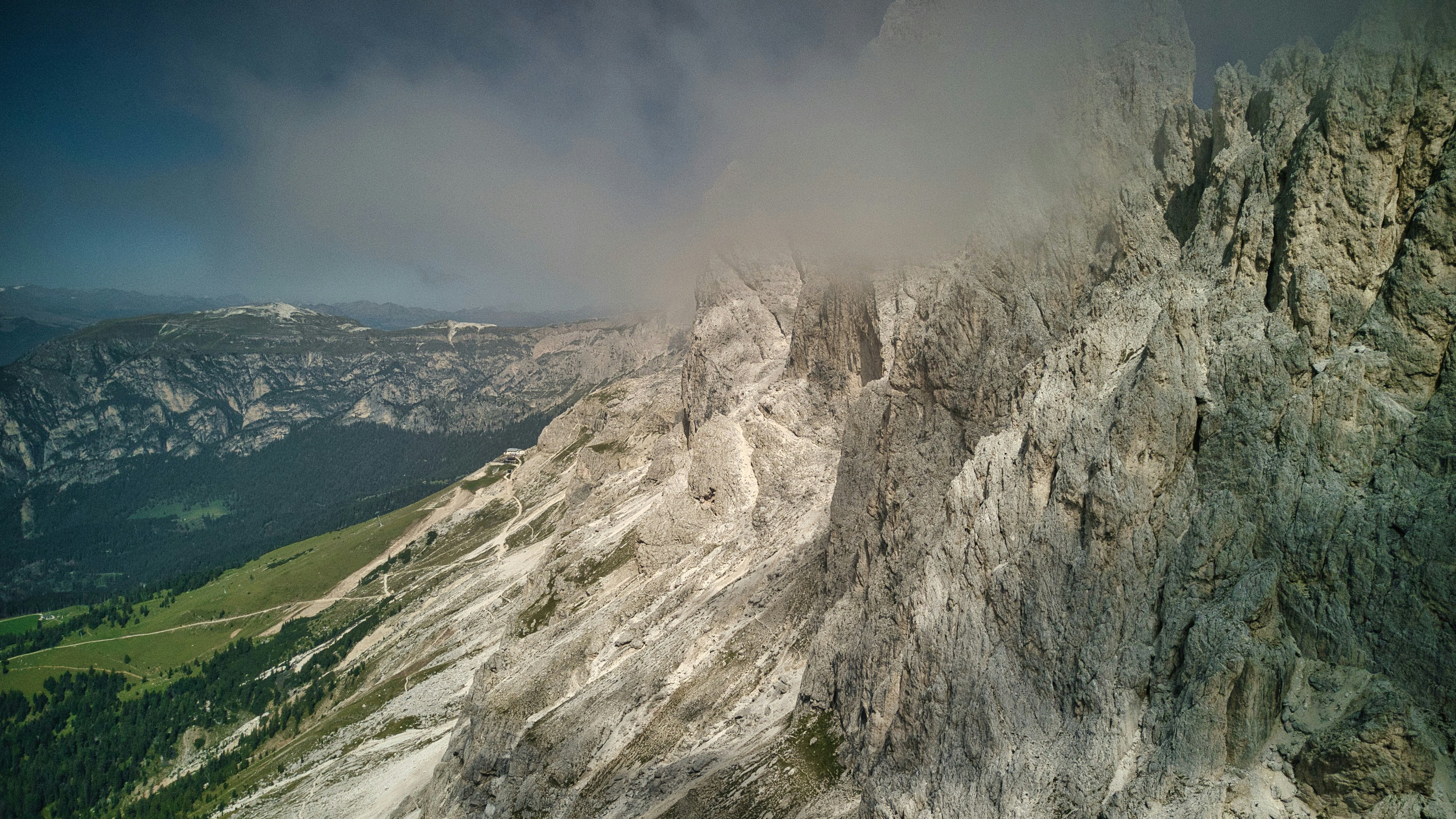 Cliff Edge in the Clouds: Ridge and Mist at Dusk