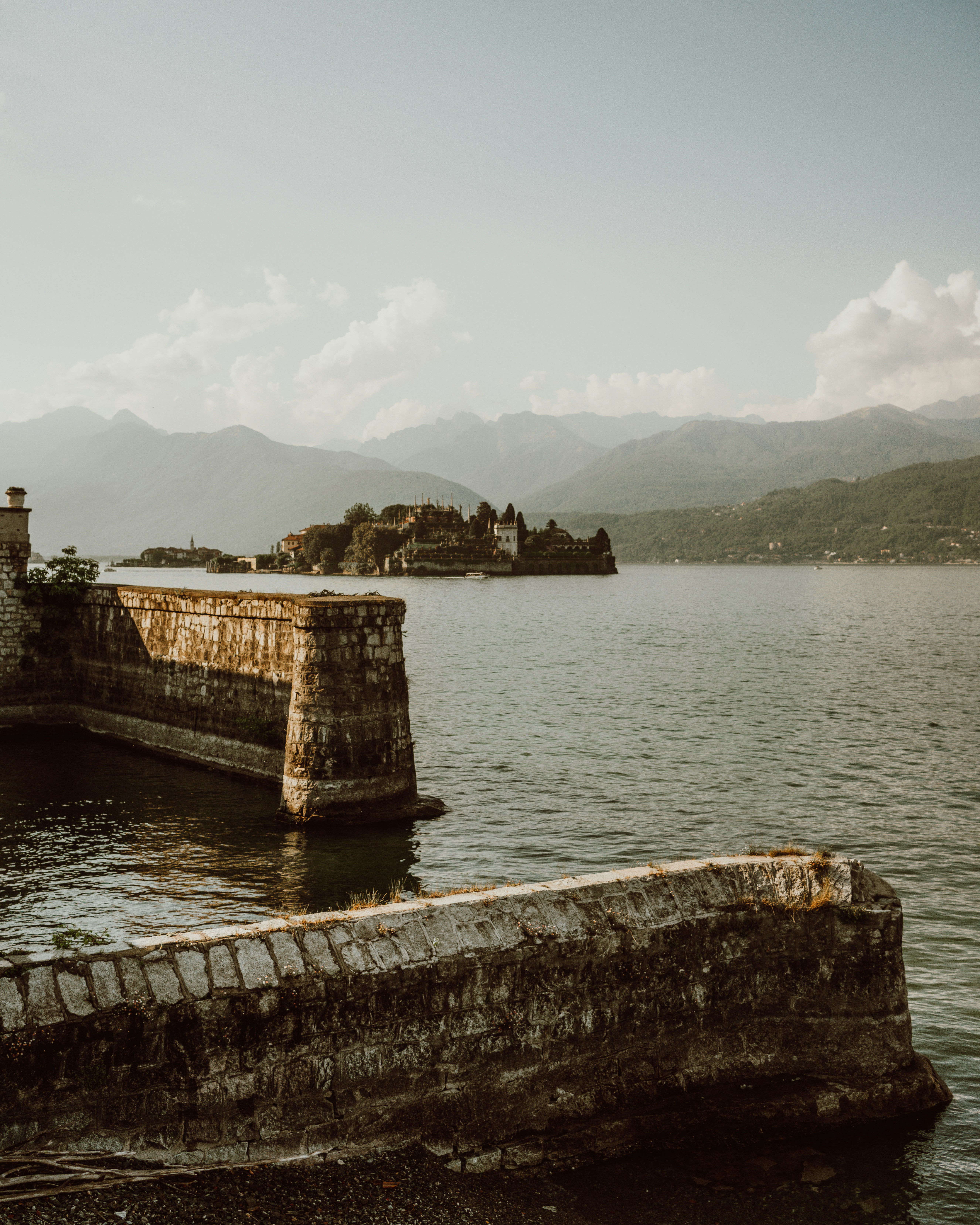 Fortress Edge: Stone Walls Defining Quiet Lake Panorama