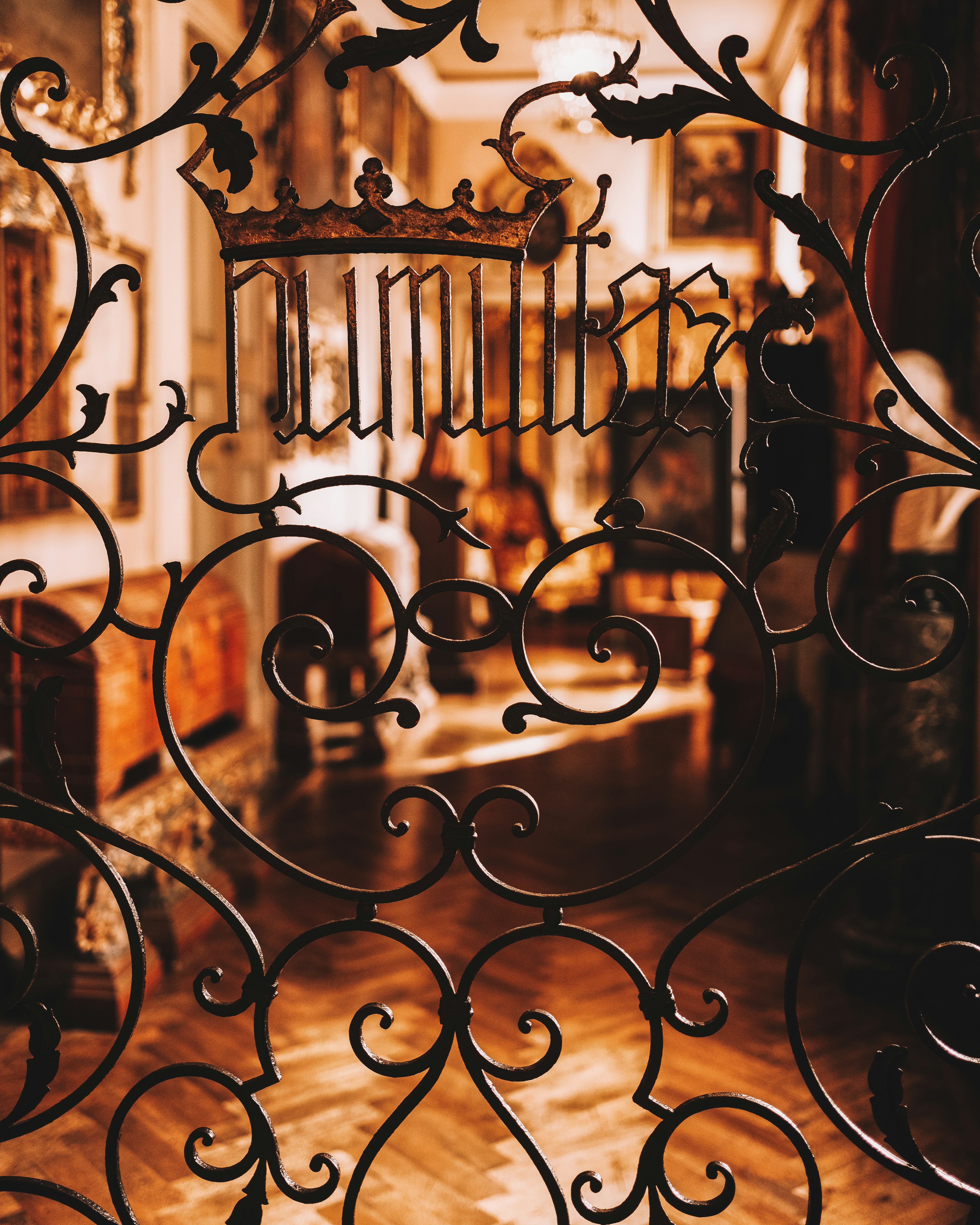 A wrought iron gate with the word autumn written on it photo – Free ...