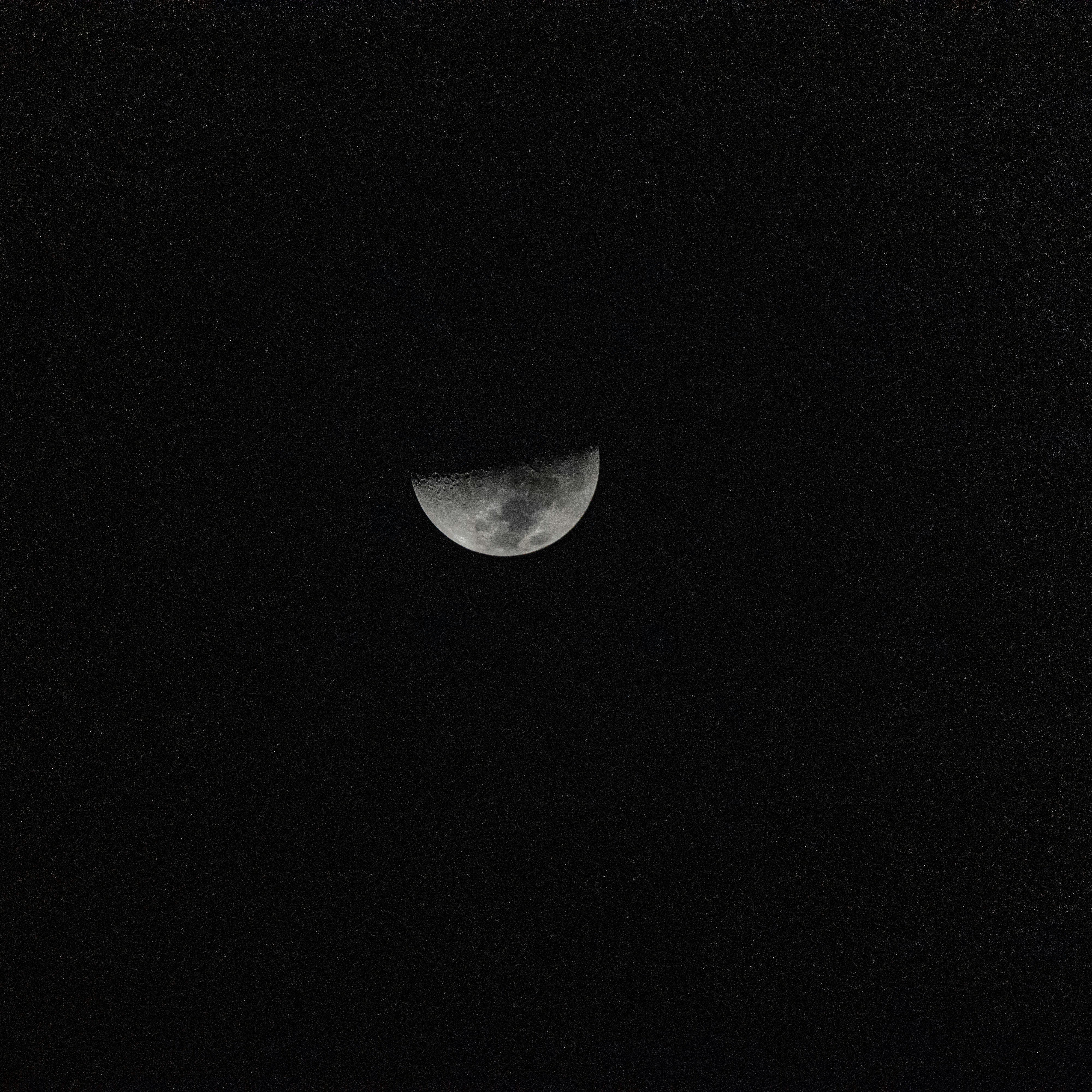 A half moon is seen in the dark sky photo – Free Half moon Image on ...