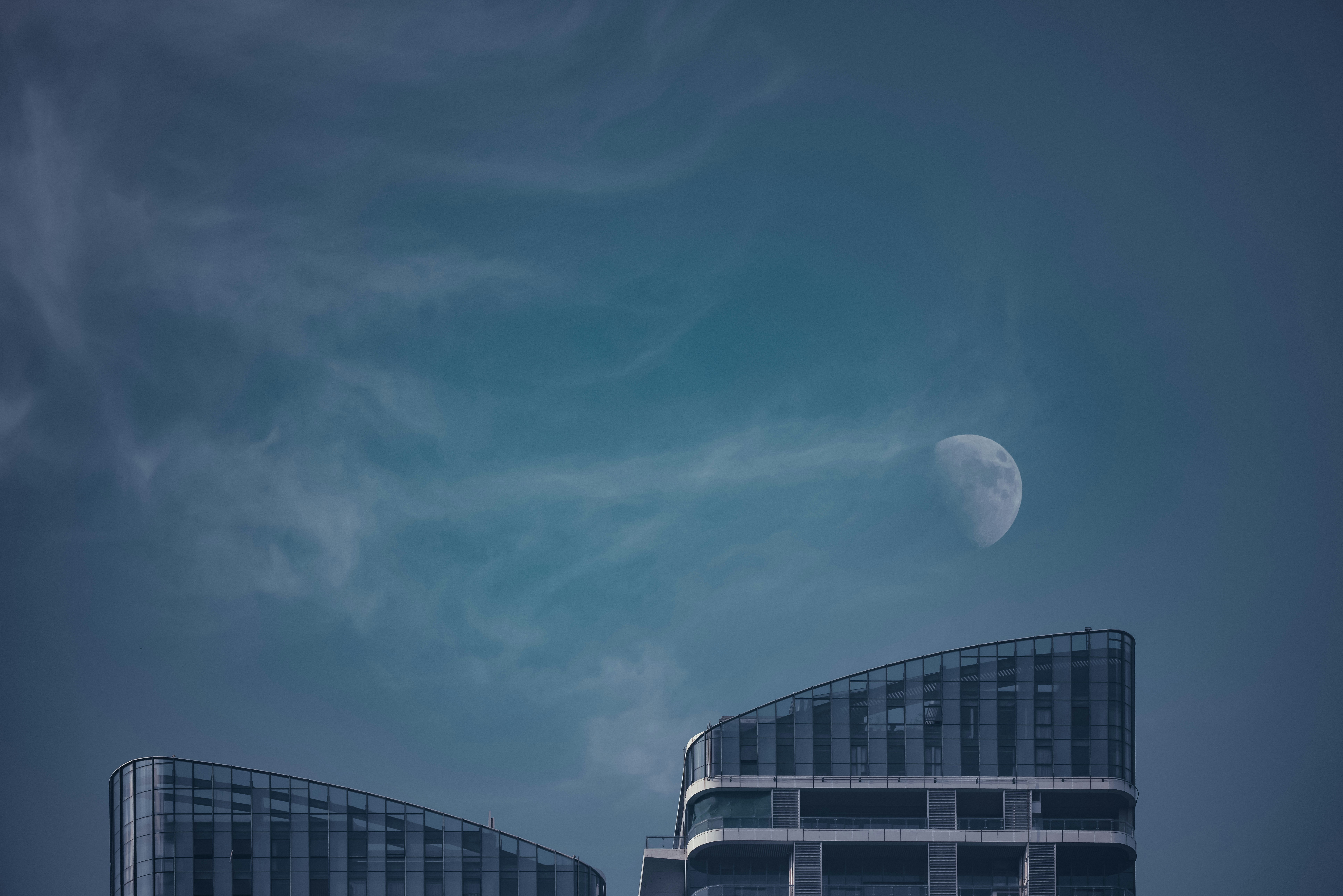 A building with a half moon in the sky photo – Free Image on Unsplash