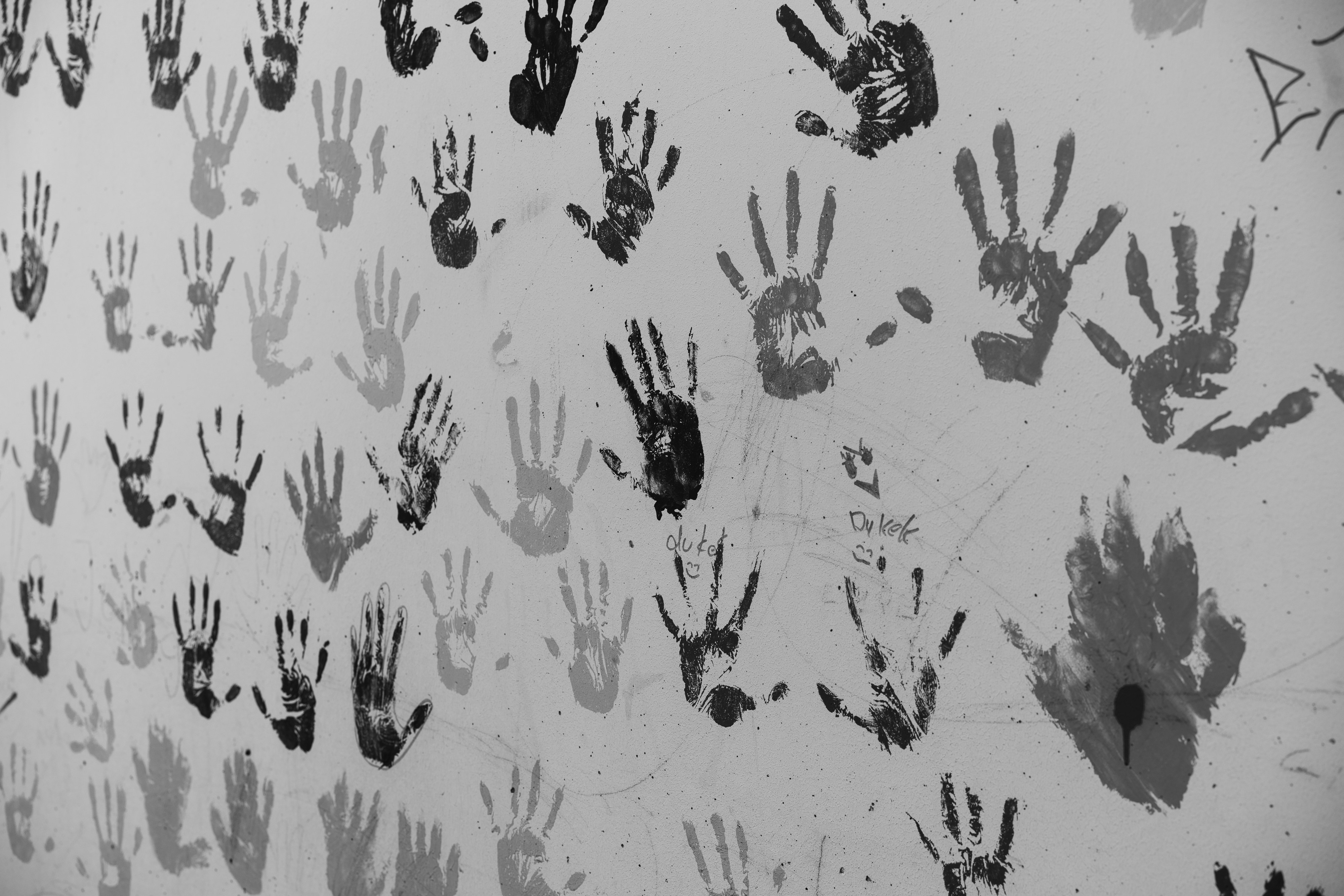 A group of hand prints on a wall photo – Free Art Image on Unsplash