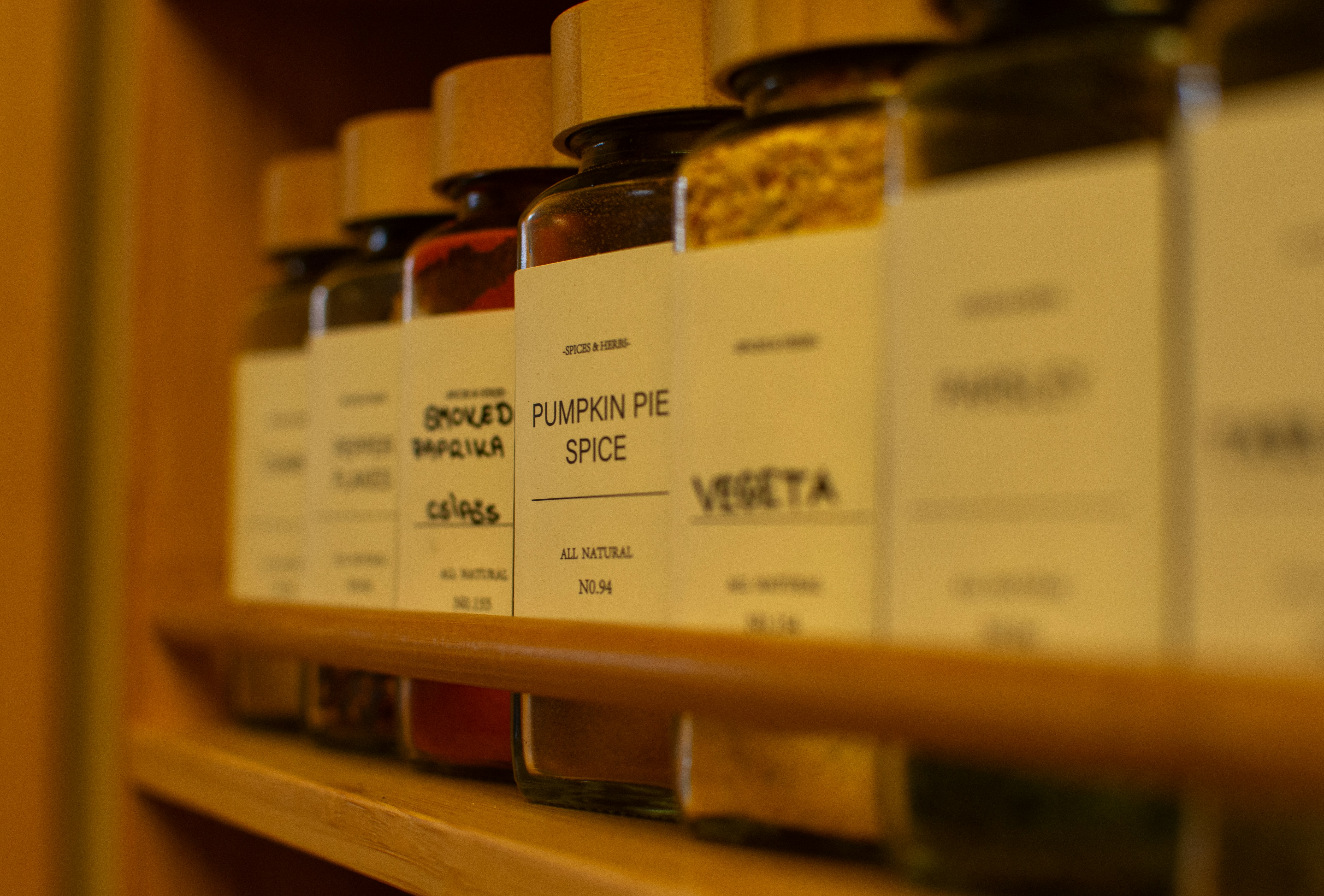 A shelf filled with lots of different types of spices photo – Free Chef ...
