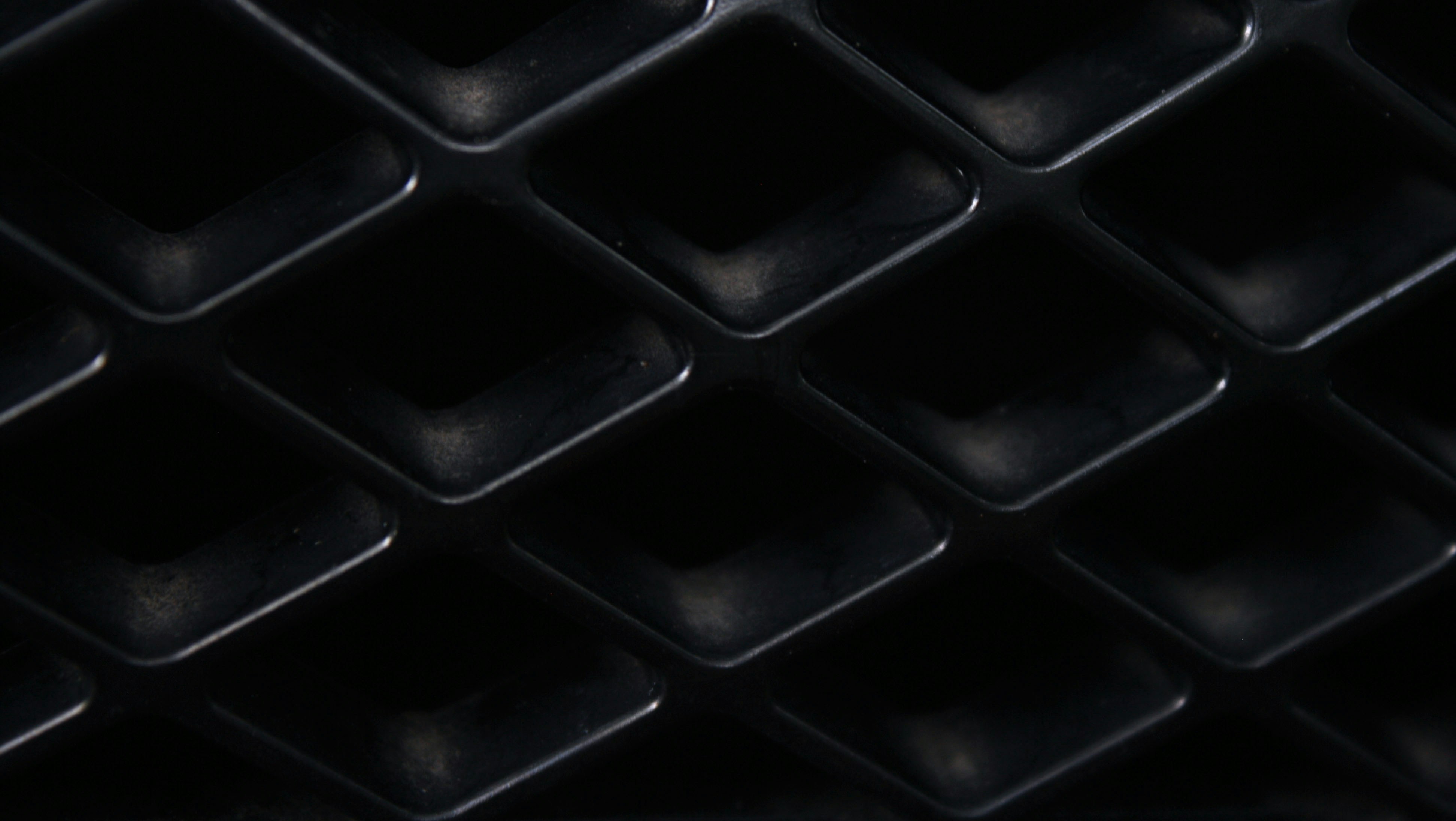 A close up view of a black plastic object photo – Free Black Image on ...